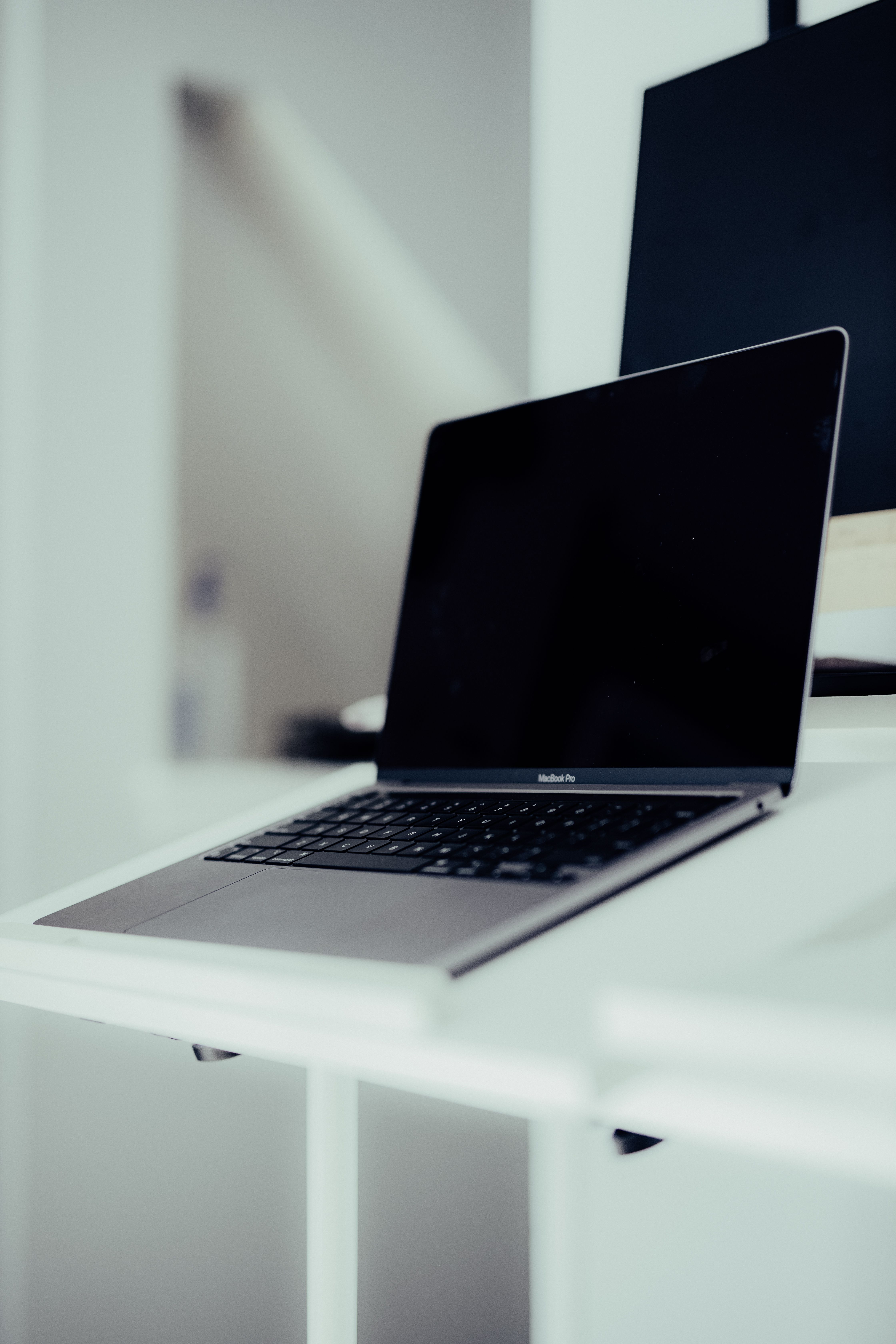 Man Working on Apple MacBook Pro Laptop · Free Stock Photo