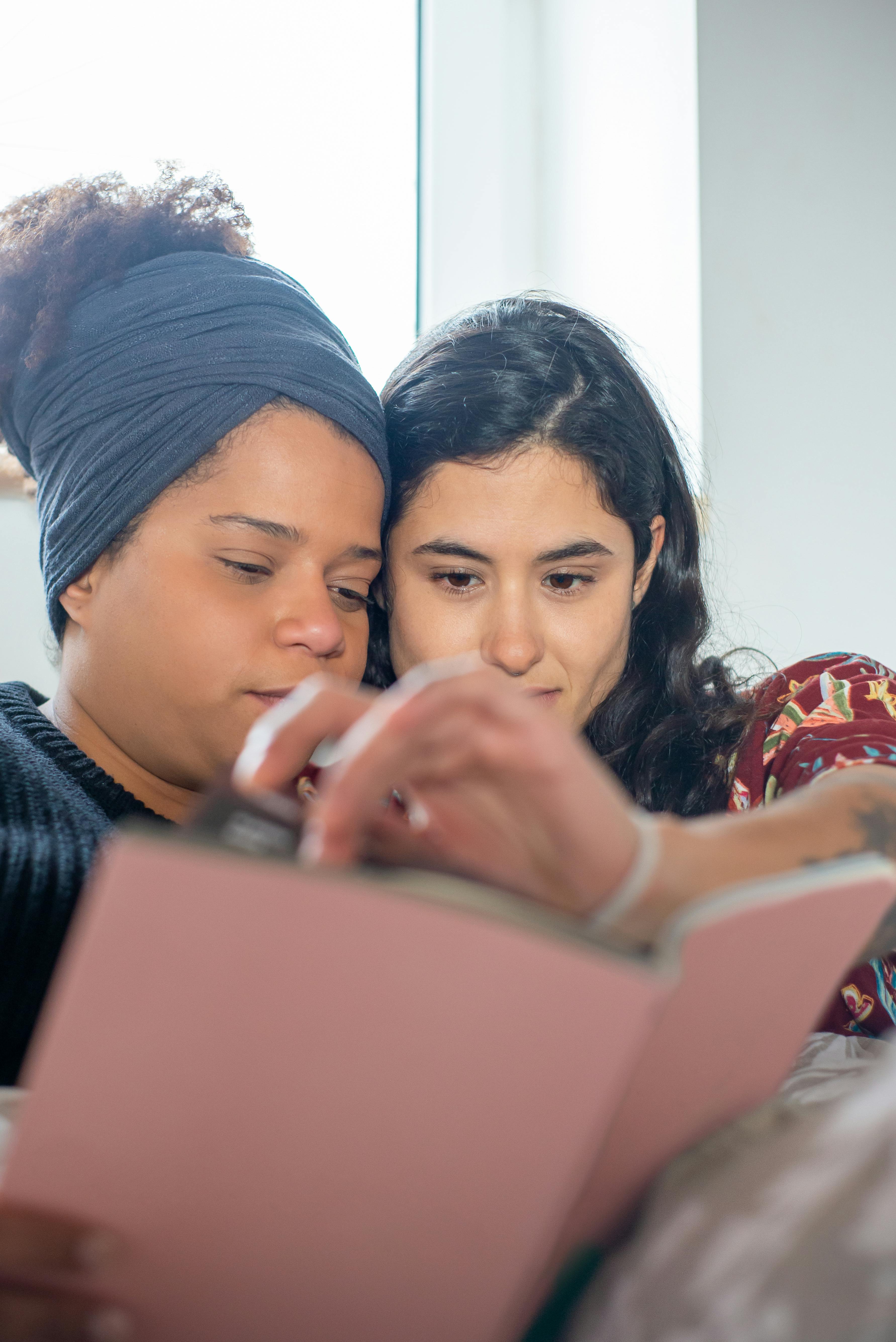 A Couple Reading Book Together · Free Stock Photo