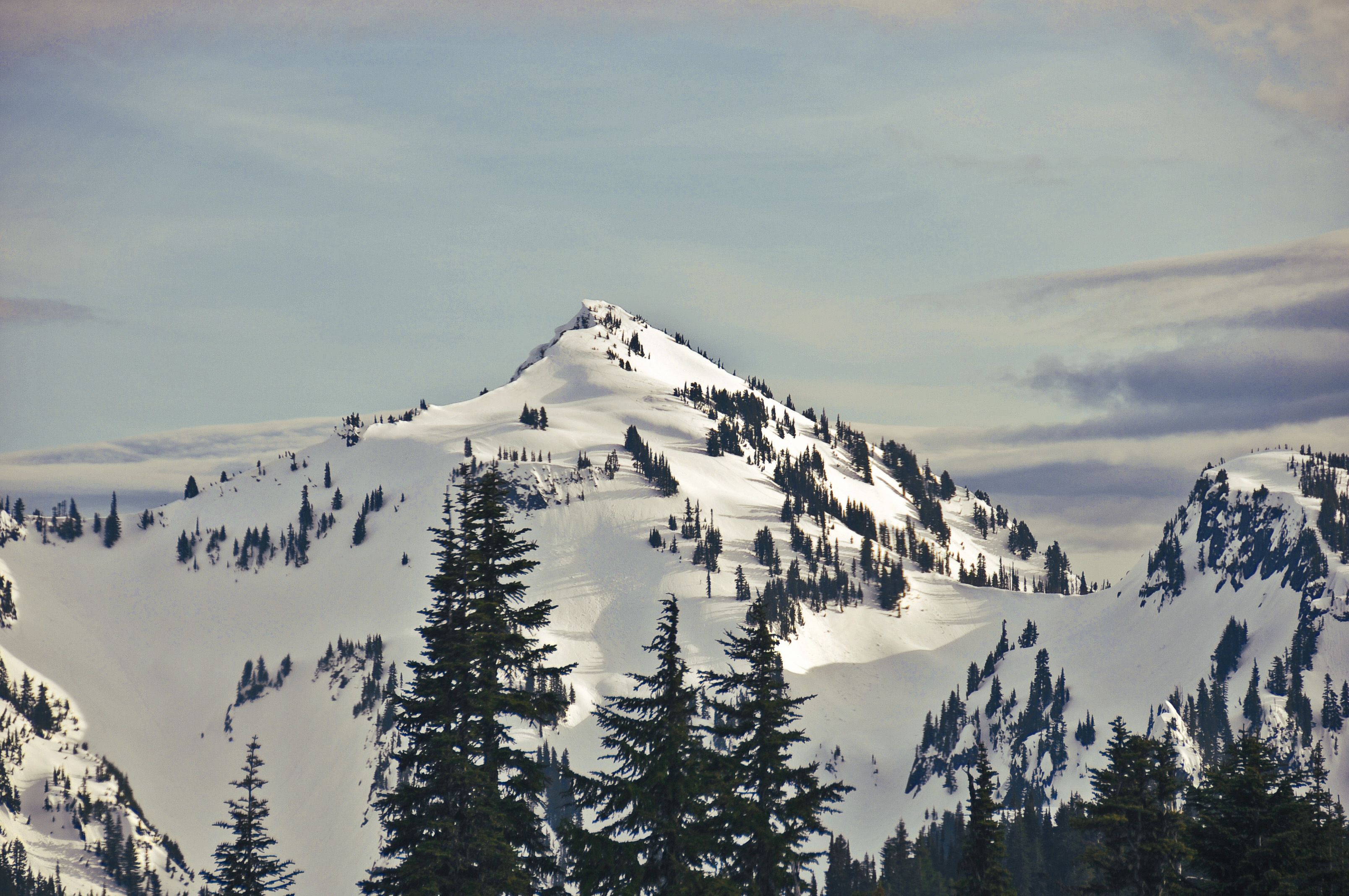 Scenic View of a Snow-Covered Mountain · Free Stock Photo