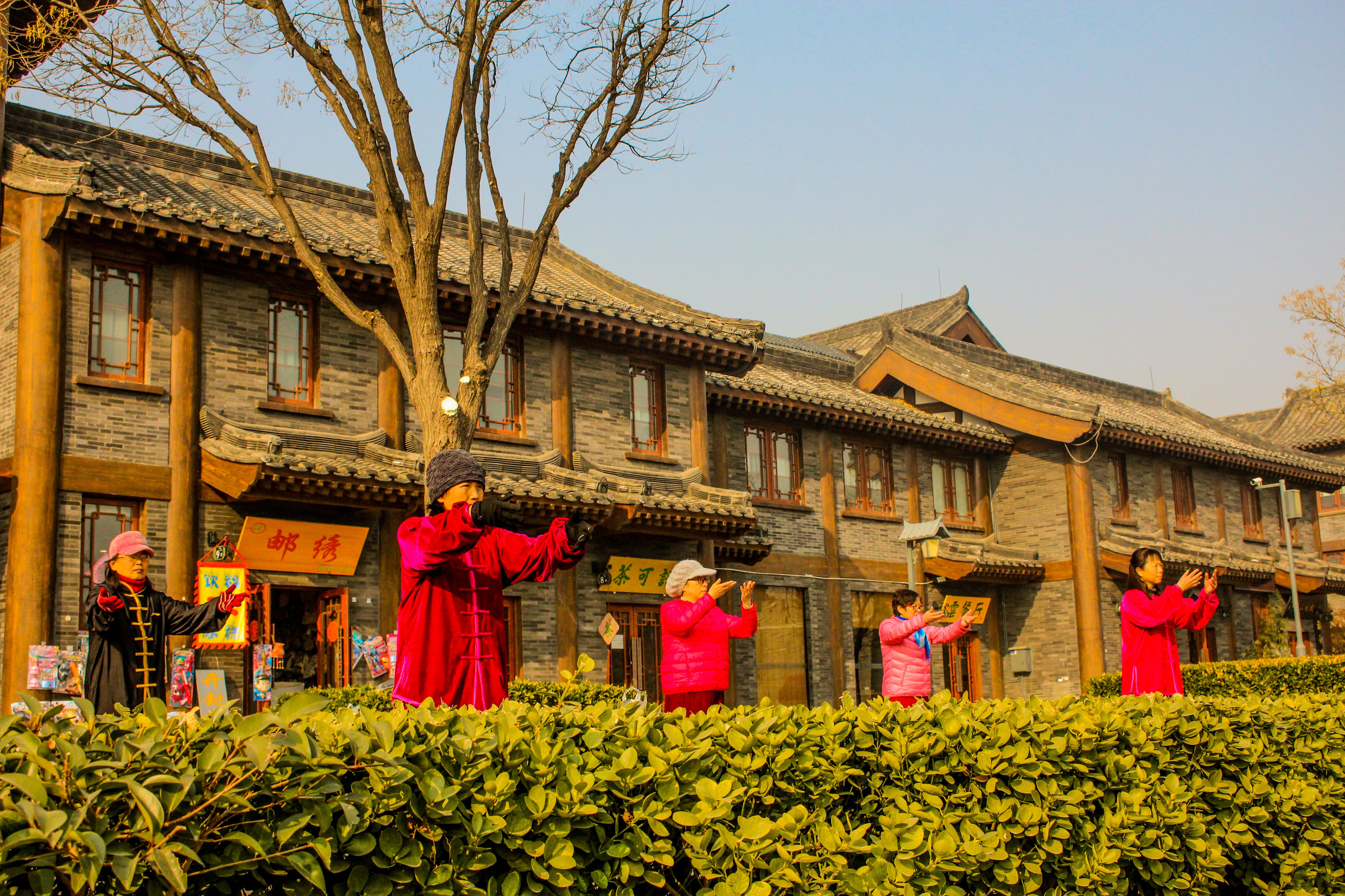 Elderly Chinese Women Exercising in front of Temple · Free Stock Photo