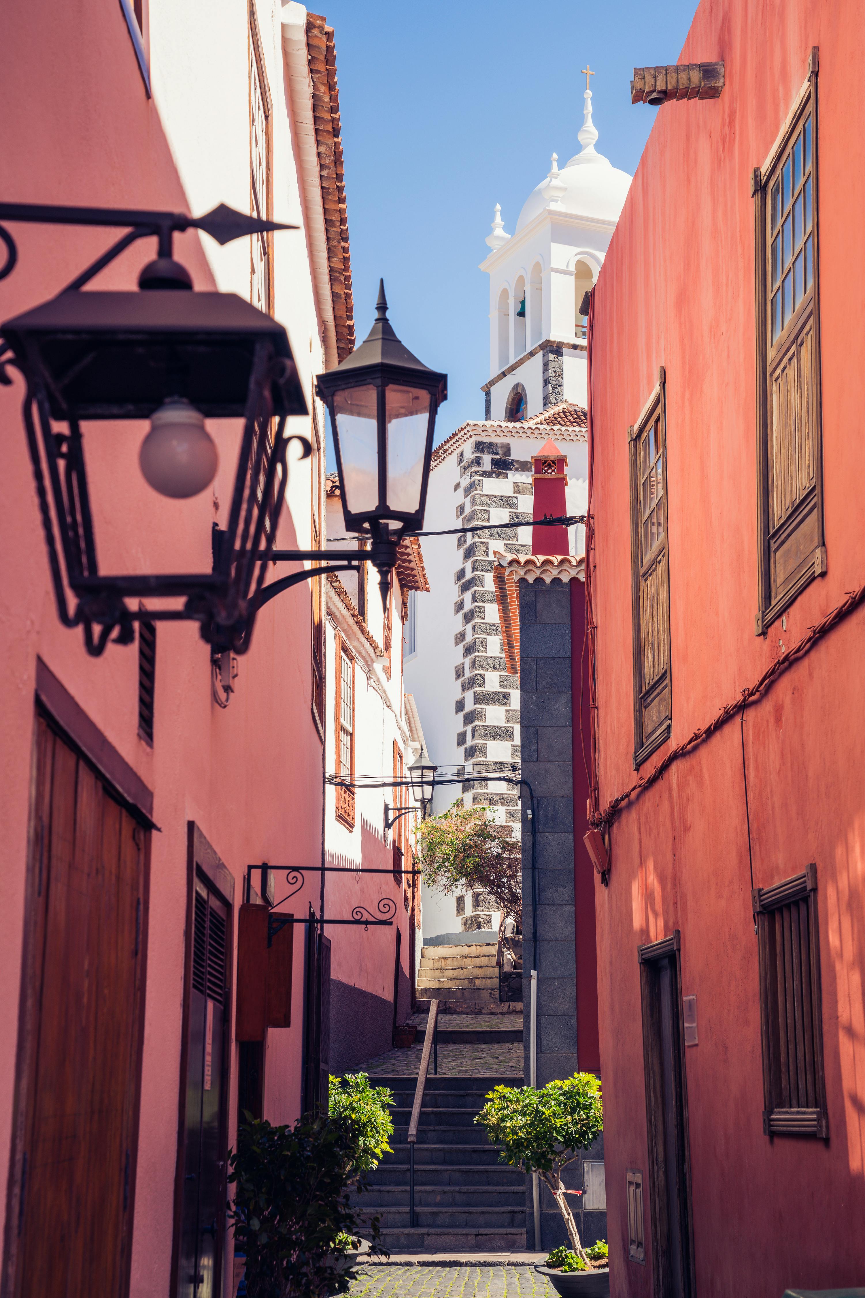 Street Lights on a Narrow Pathway · Free Stock Photo