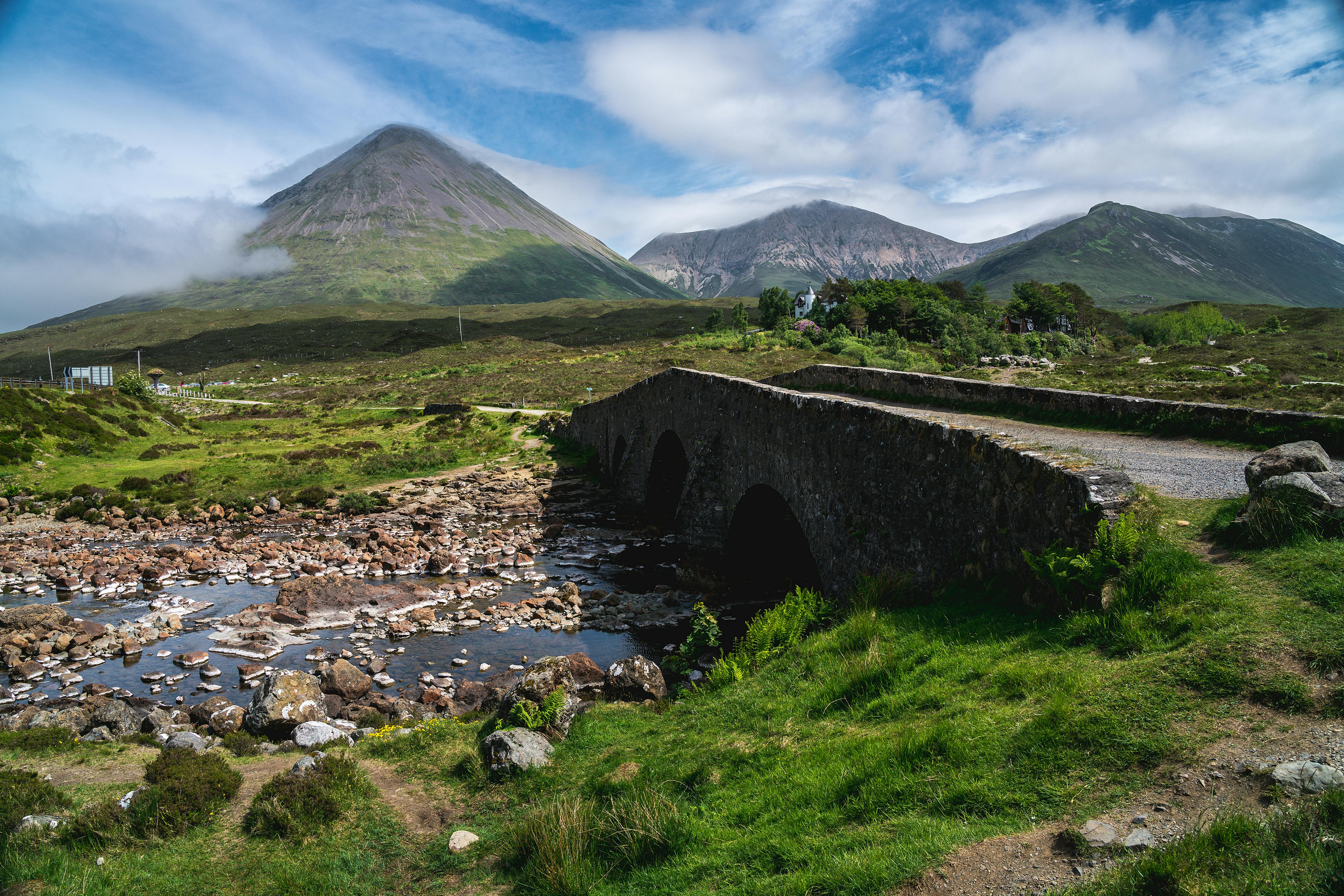 Bridge over Creek Against Mountains · Free Stock Photo
