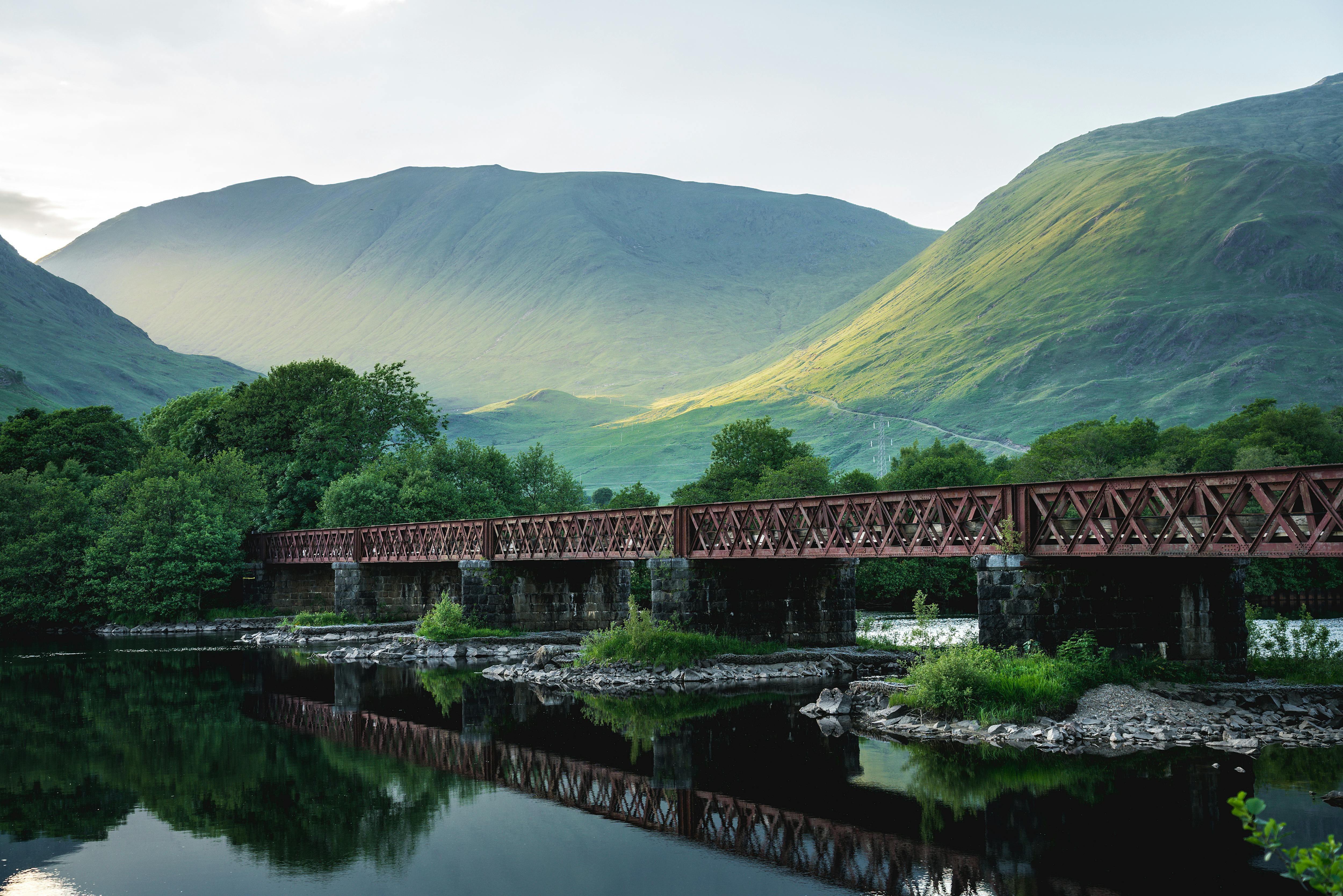 Bridge over a Lake during Day Time · Free Stock Photo
