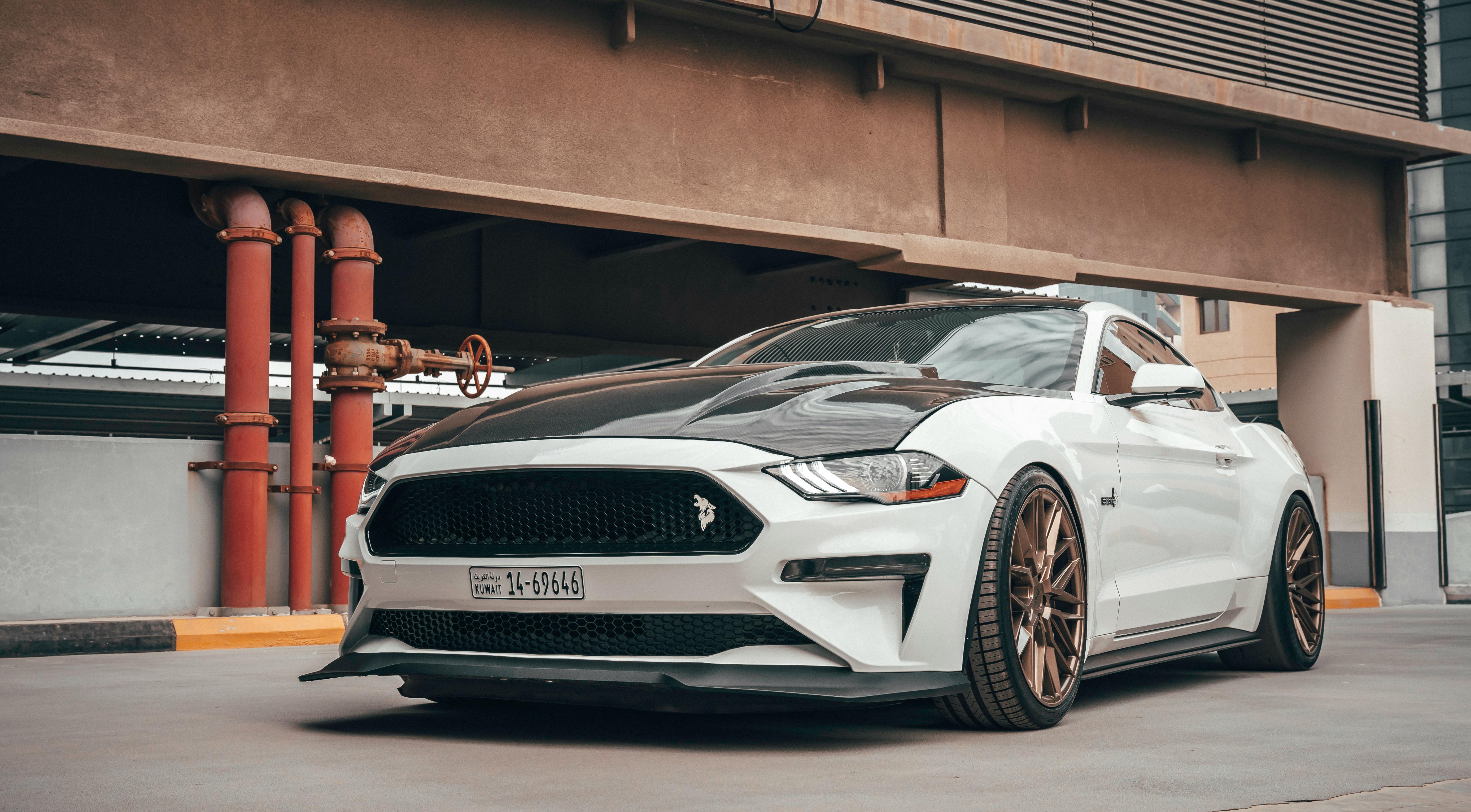 Cars Parked Outside on Concrete Road · Free Stock Photo
