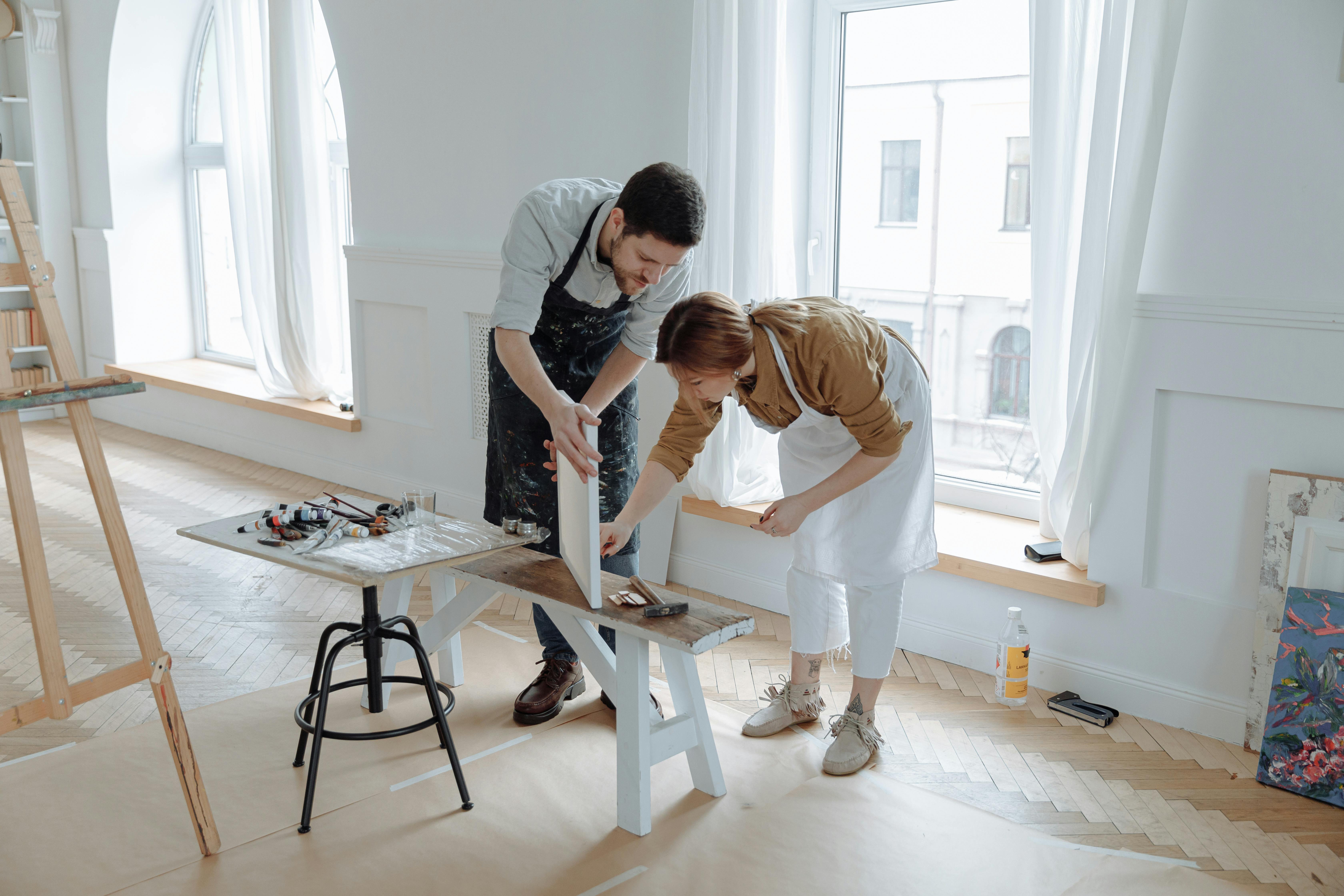 A Couple Painting Together · Free Stock Photo