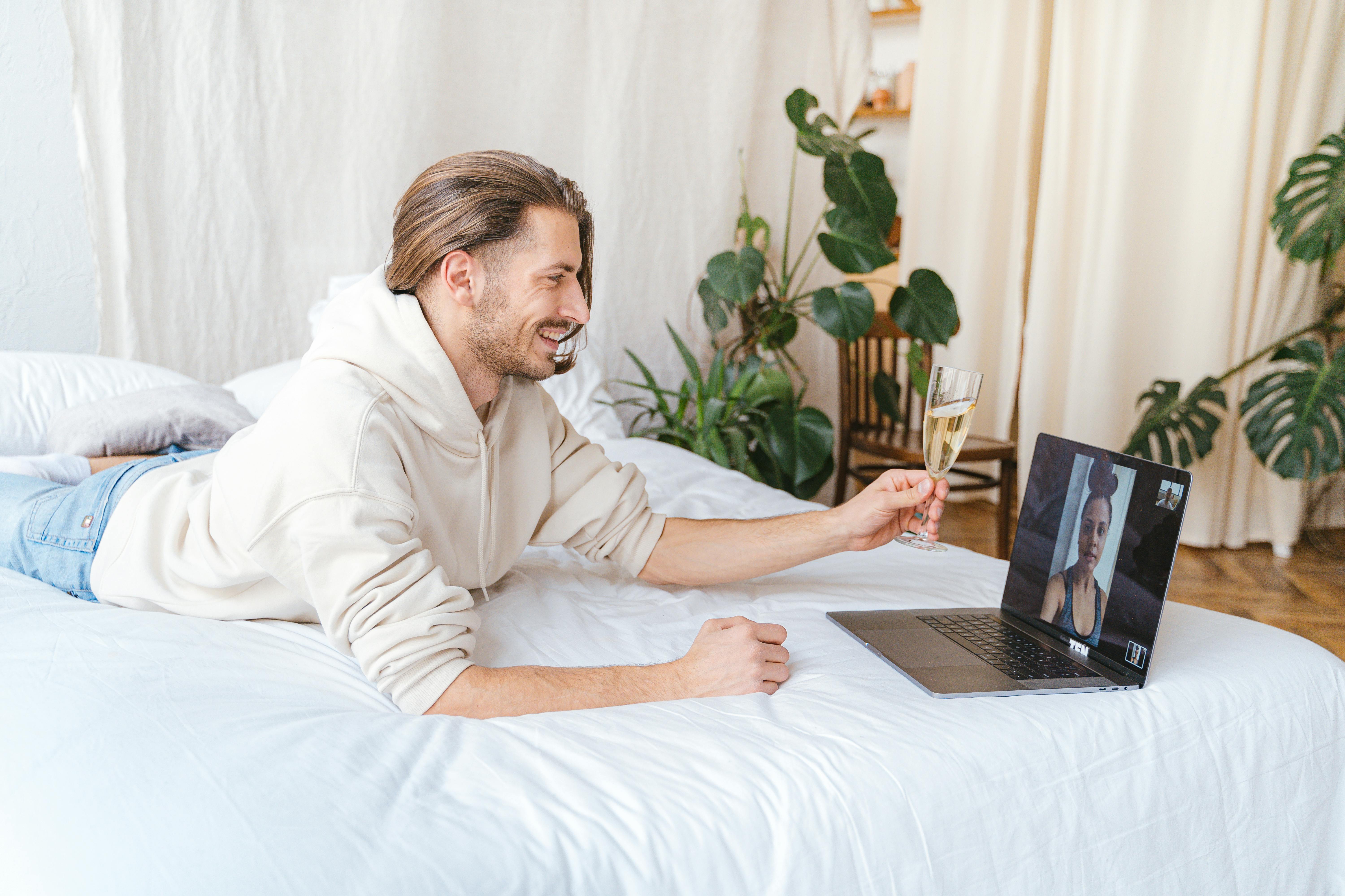 A Man Doing Video Call using a Laptop · Free Stock Photo