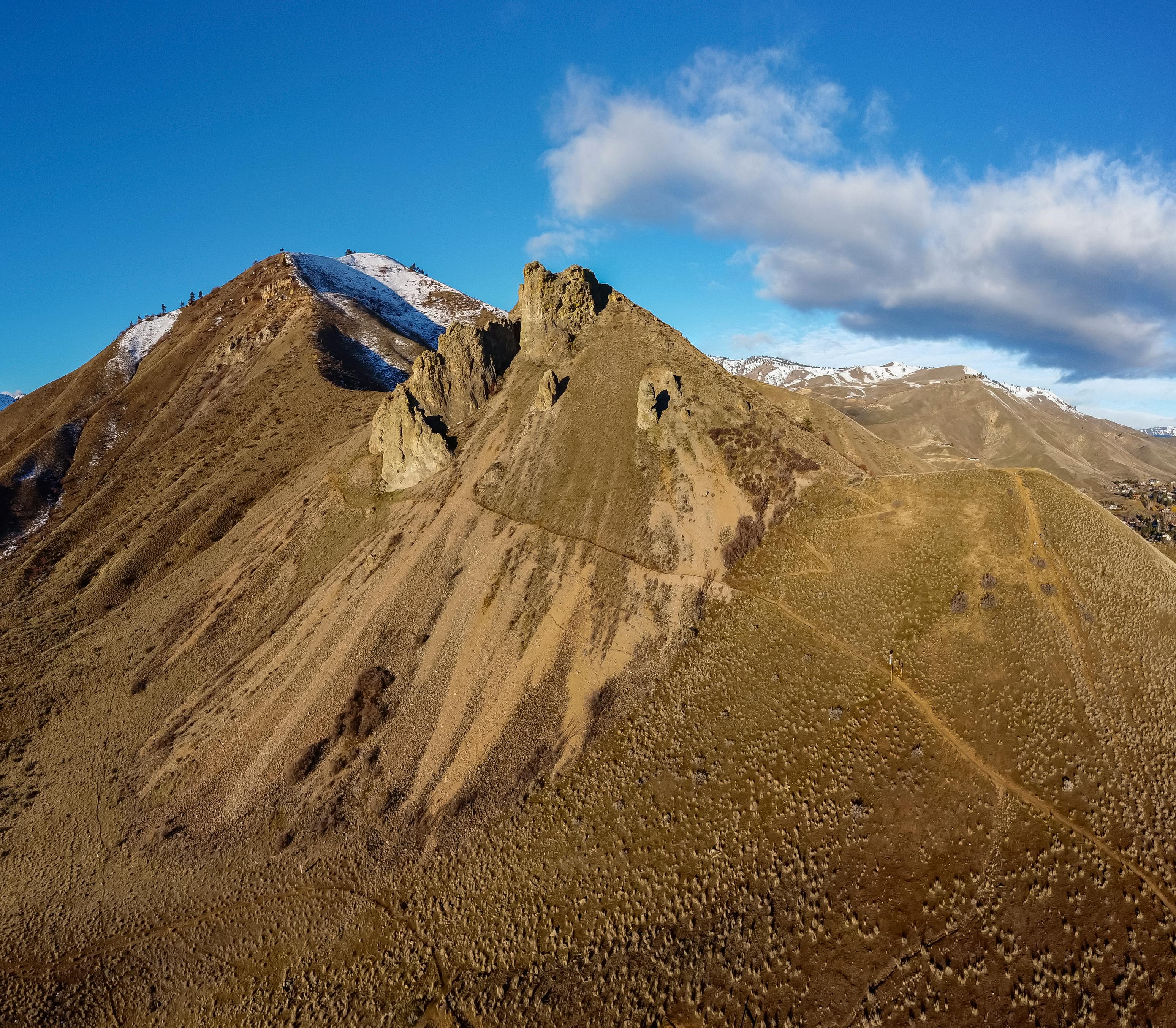 Barren Rock Formation under Clear Sky · Free Stock Photo