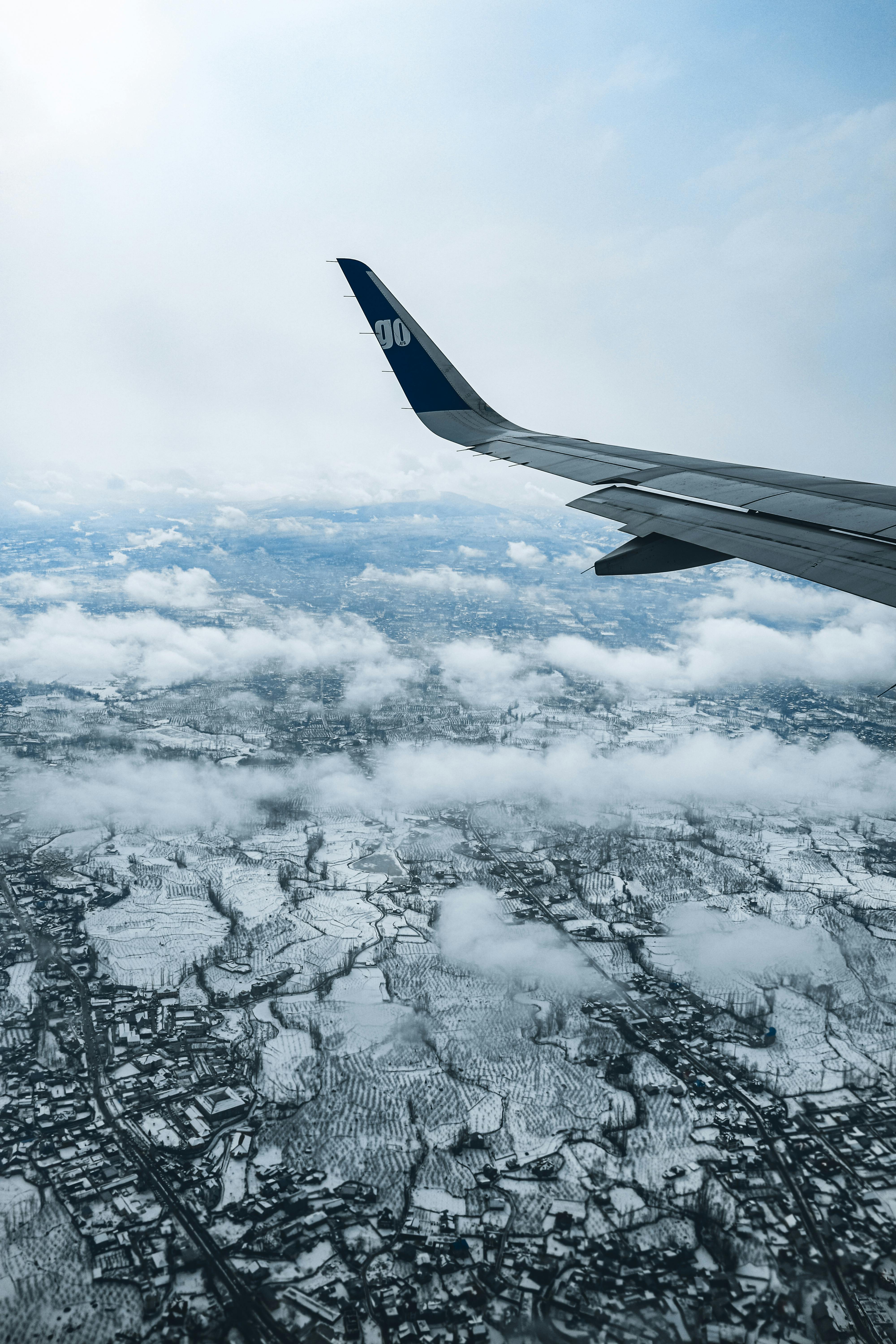 Airplane over Clouds · Free Stock Photo