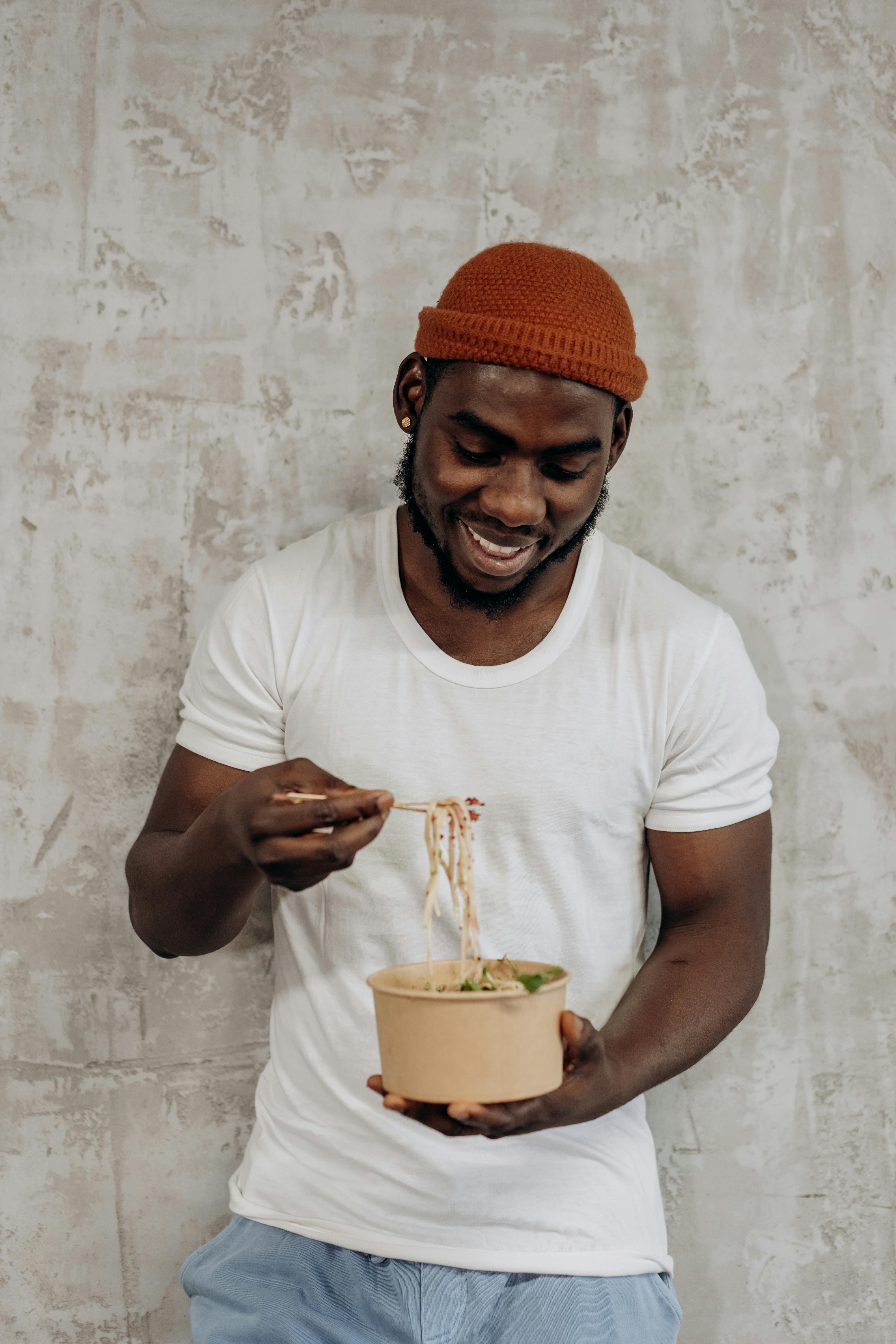 Man Eating A Rice Bowl · Free Stock Photo