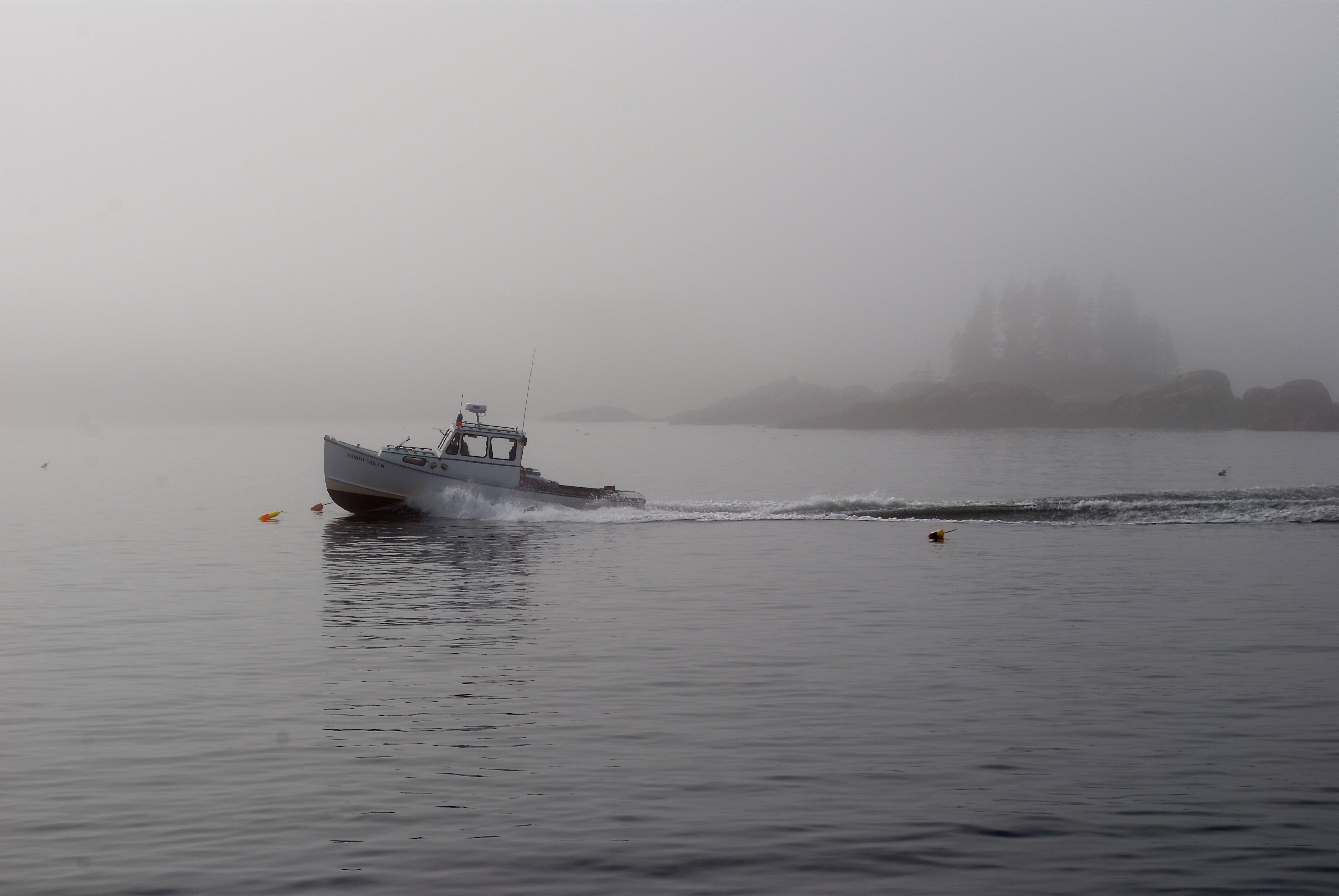 Boats on rippling river during storm · Free Stock Photo