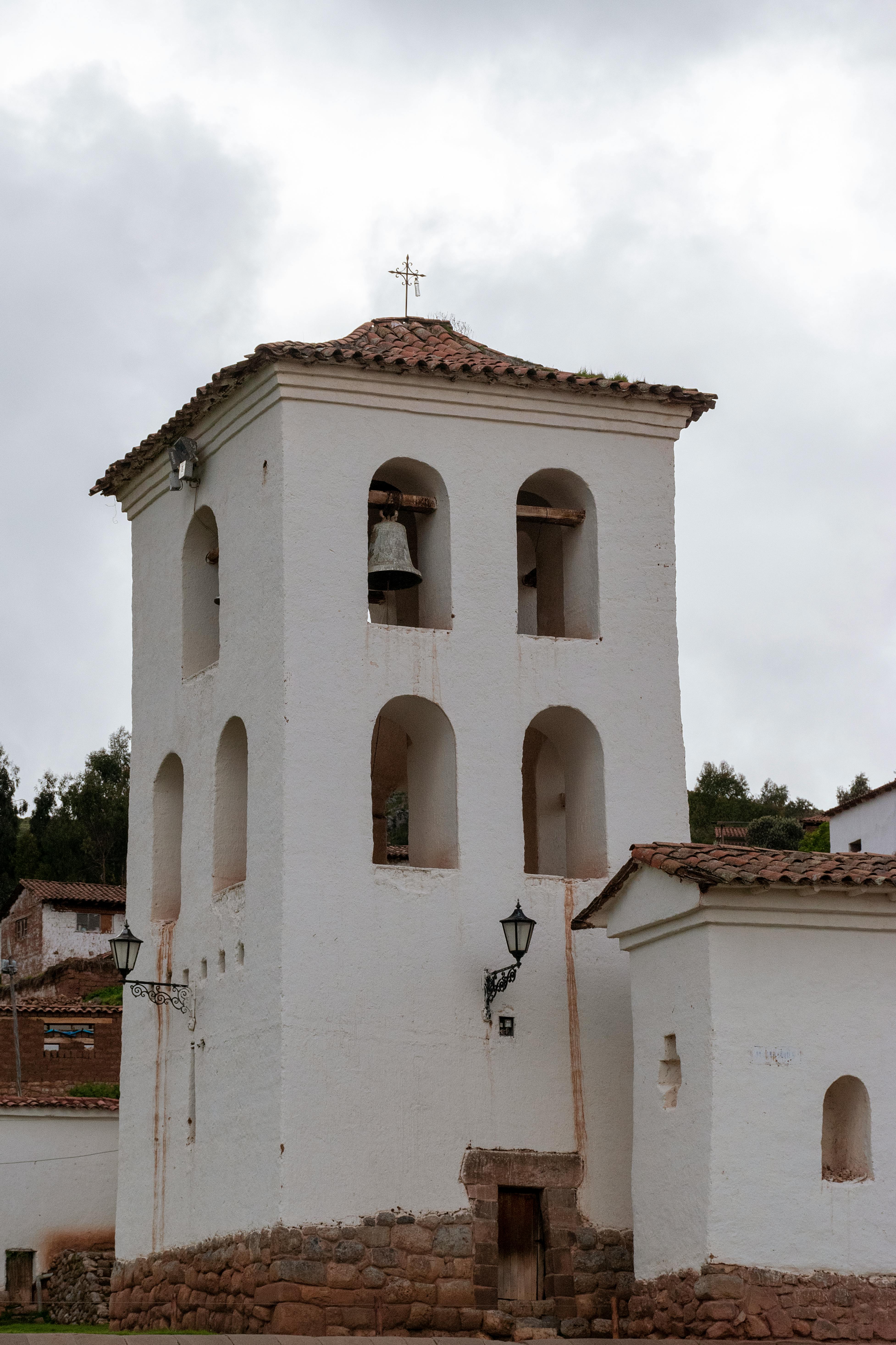 White Bell Tower with Arched Windows · Free Stock Photo