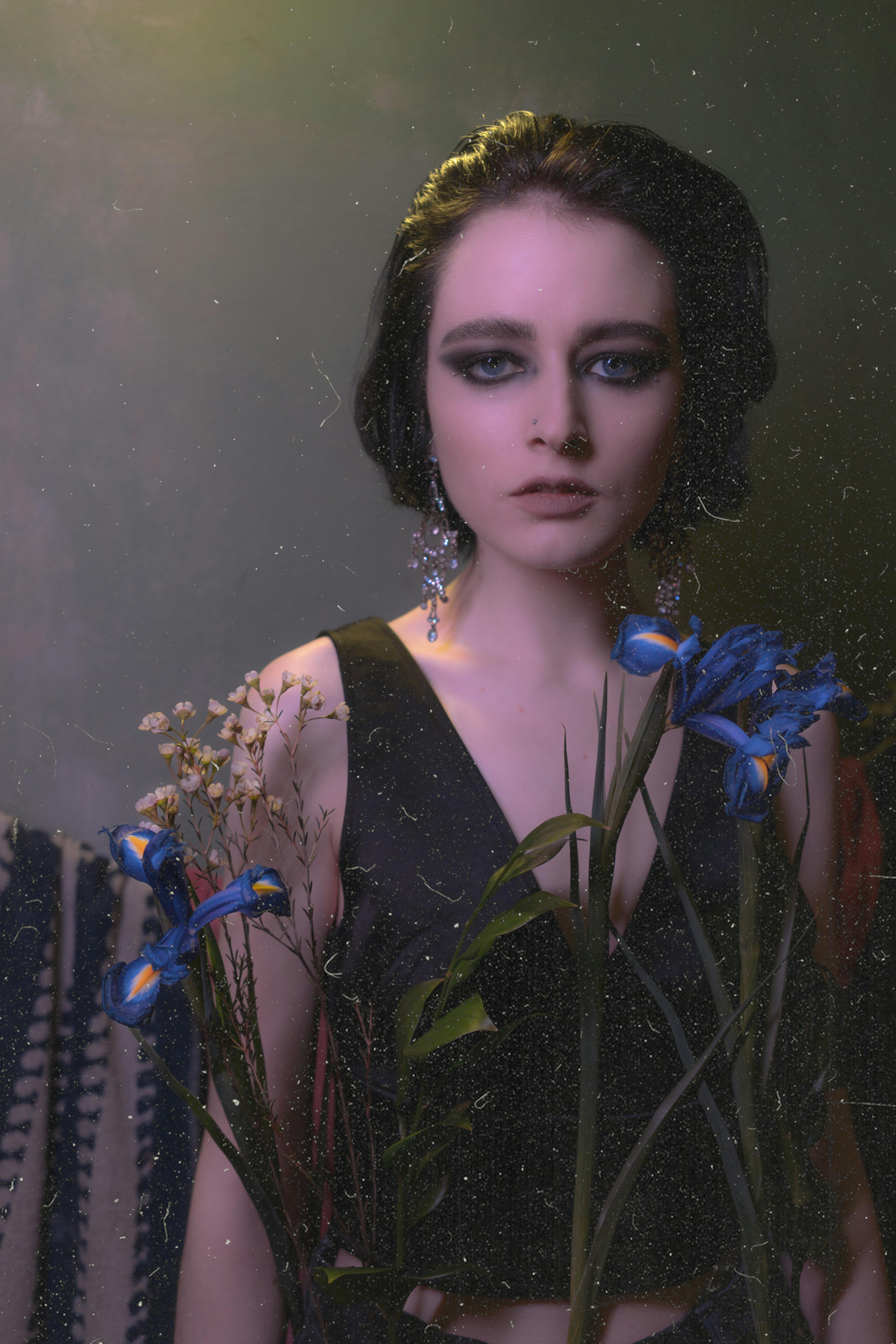 Woman with eyes closed reflecting in wet mirror · Free Stock Photo