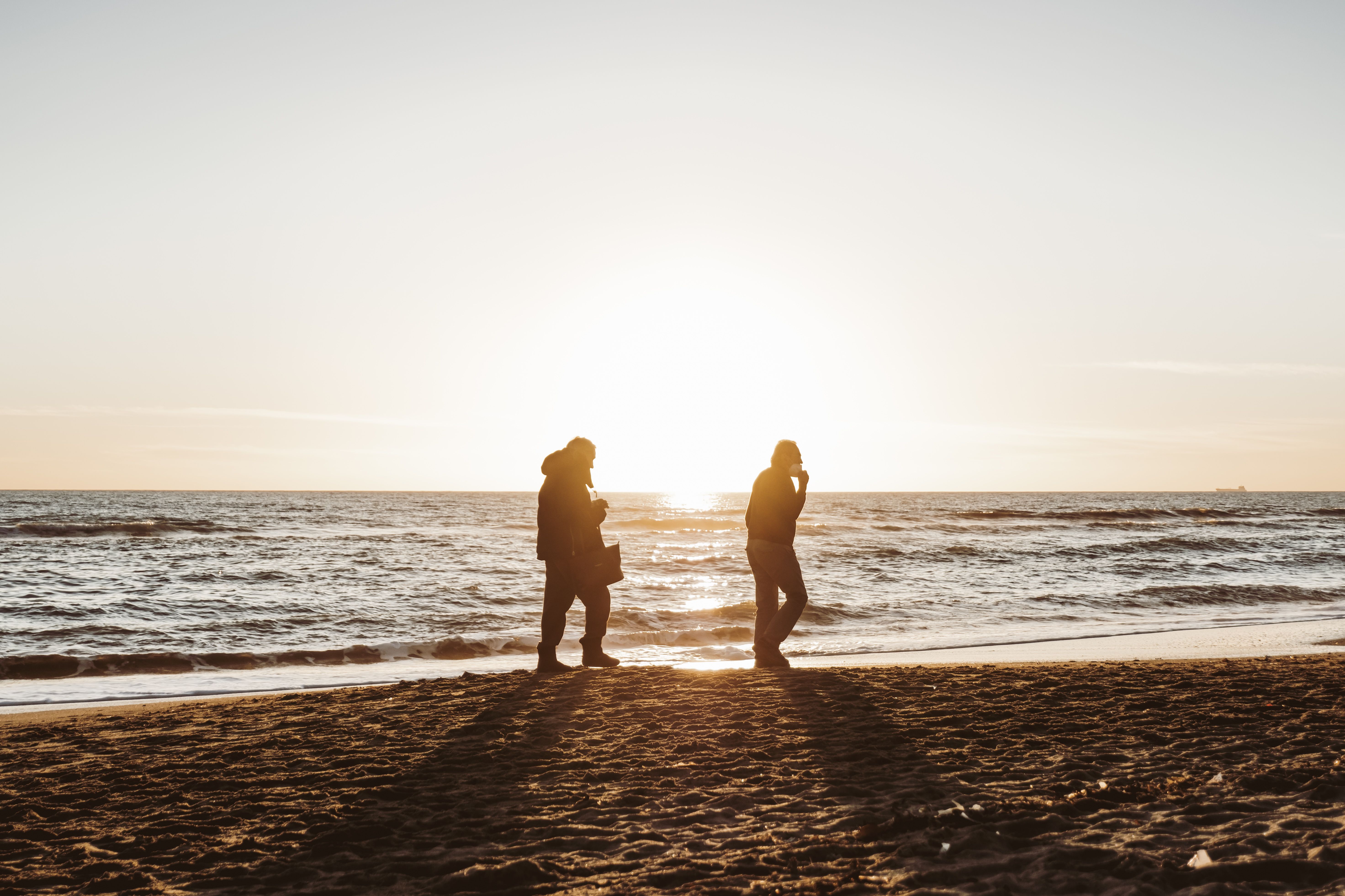 Person with Sun Between Hands · Free Stock Photo