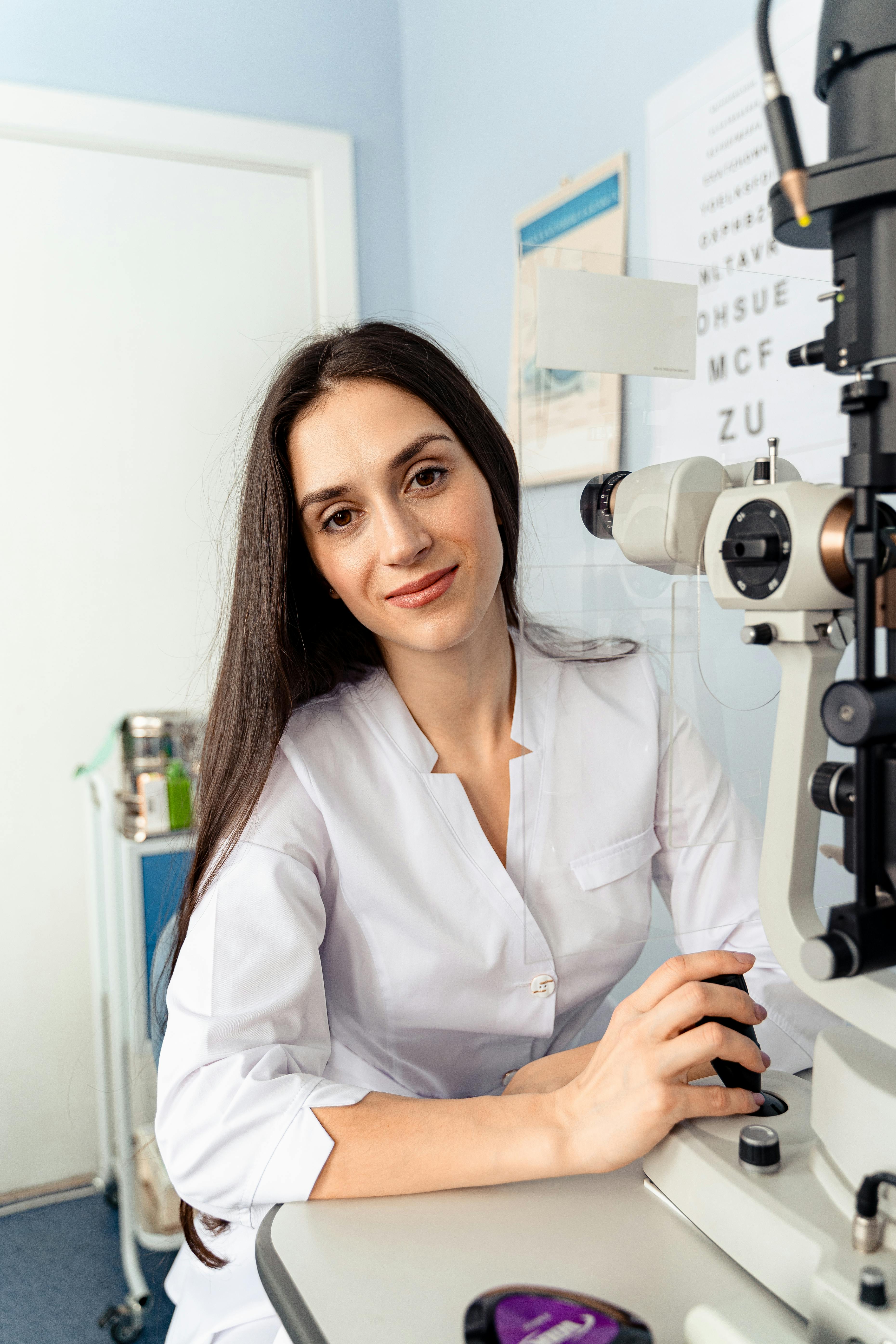 An Optometrist Wearing a White Coat · Free Stock Photo