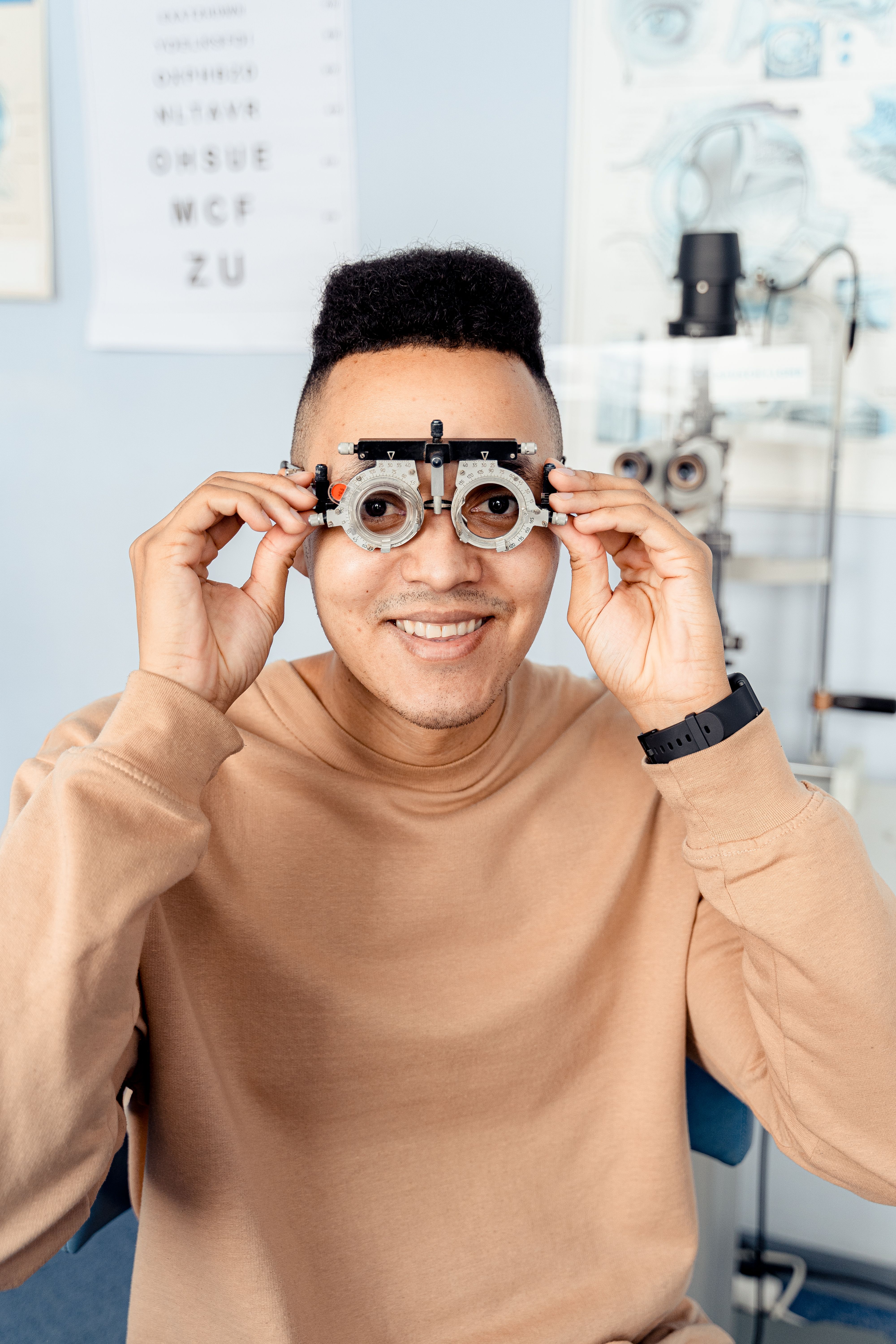 A Man Wearing a Trial Frame · Free Stock Photo