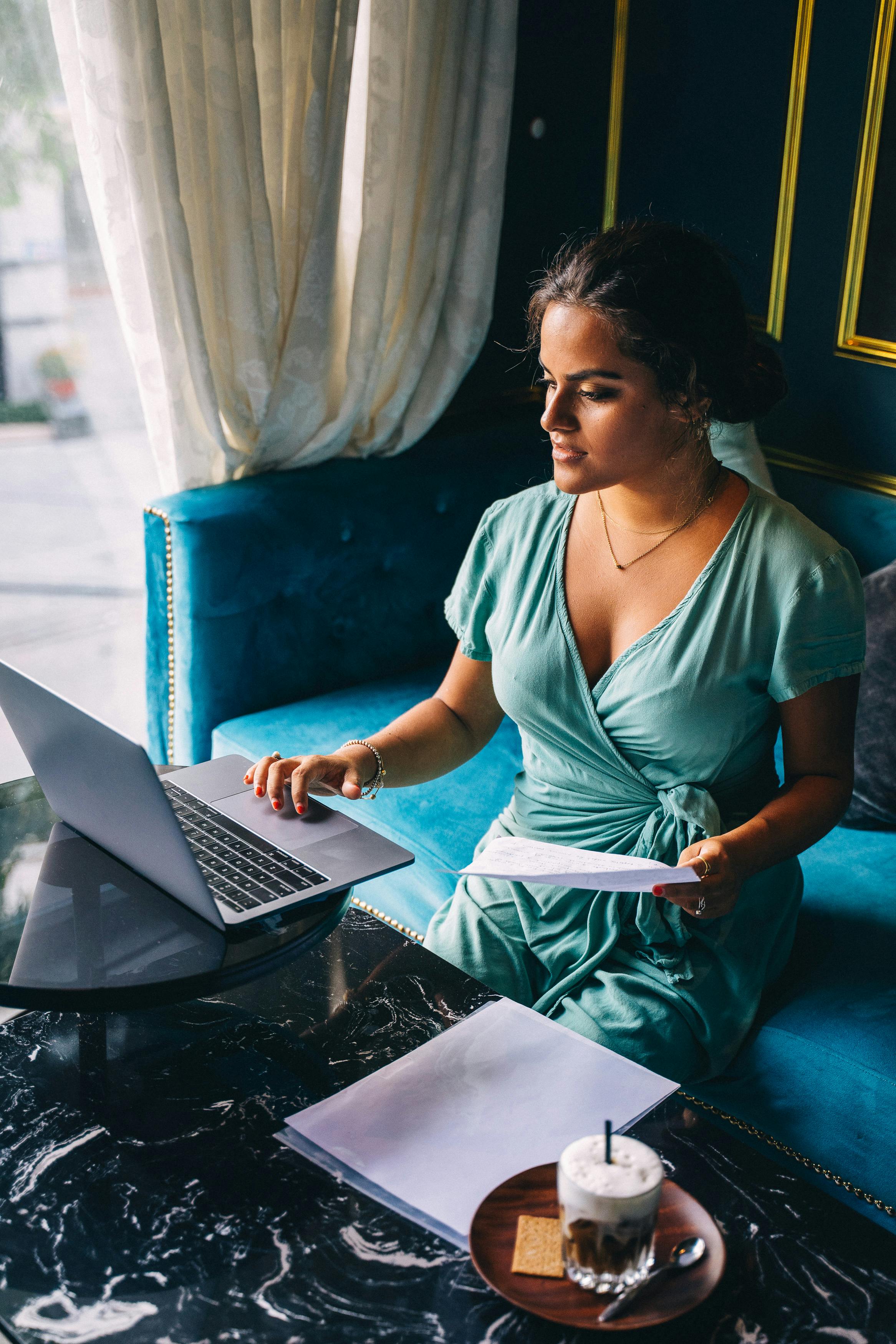 A Woman Reading a Paper · Free Stock Photo