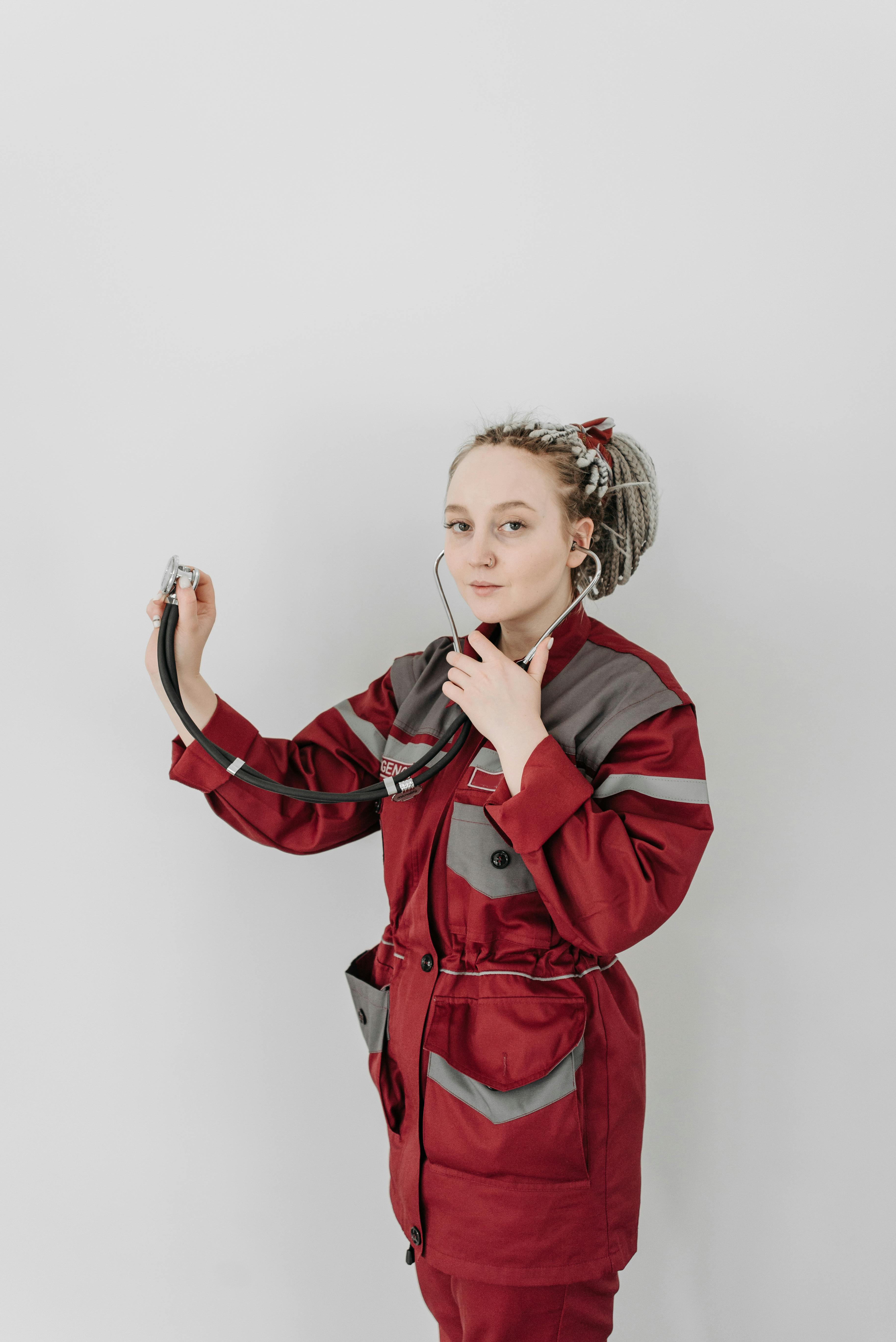 EMT In Red Uniform · Free Stock Photo