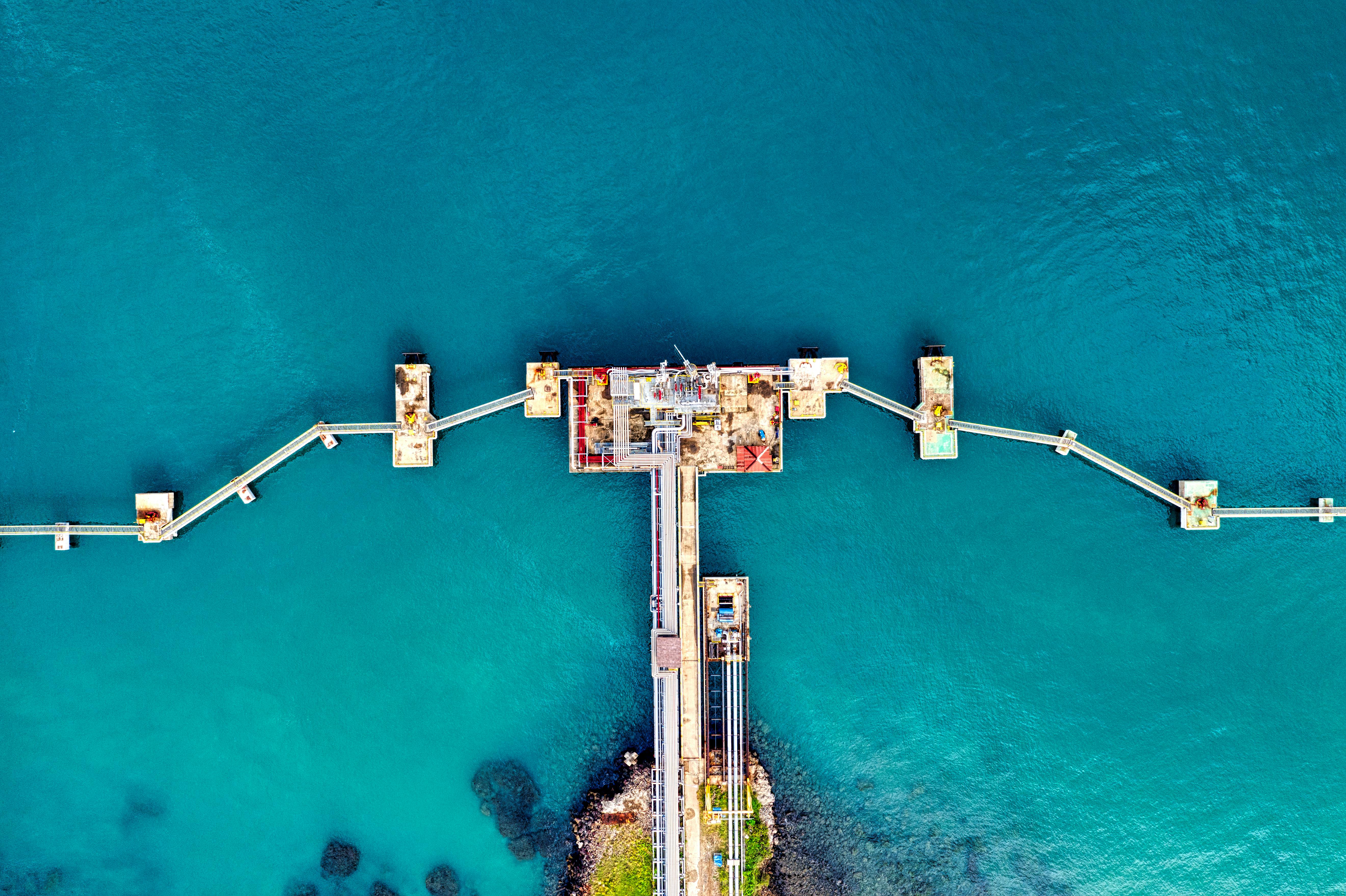 Birds Eye View of Sunlit Pier · Free Stock Photo