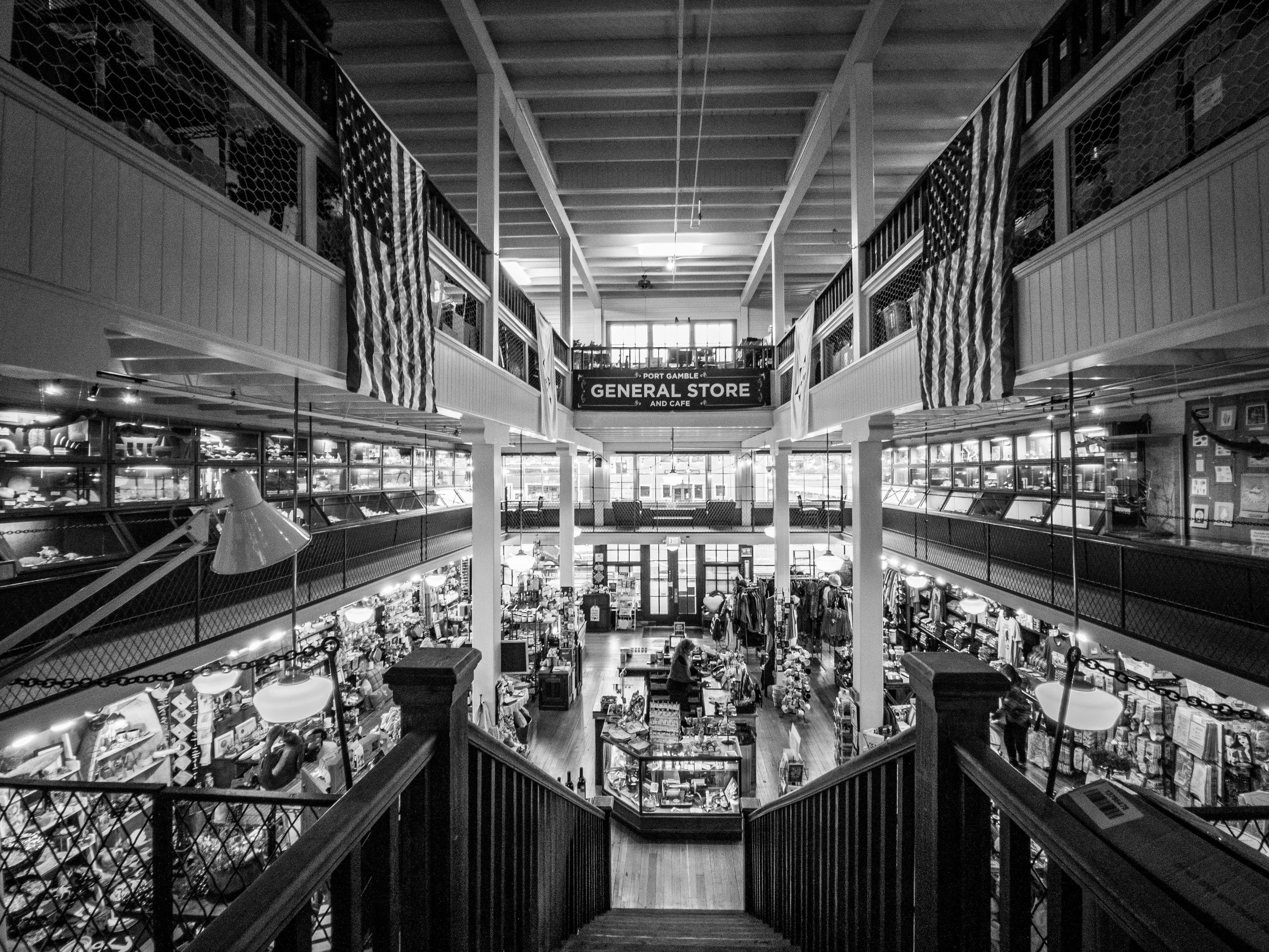 Black and White Photo of the Interior of a Shopping Mall · Free Stock Photo