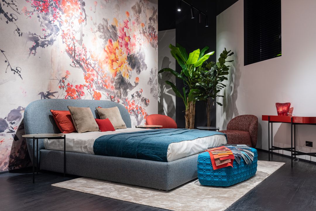 What wall should your bed be on for better sleep and rest?