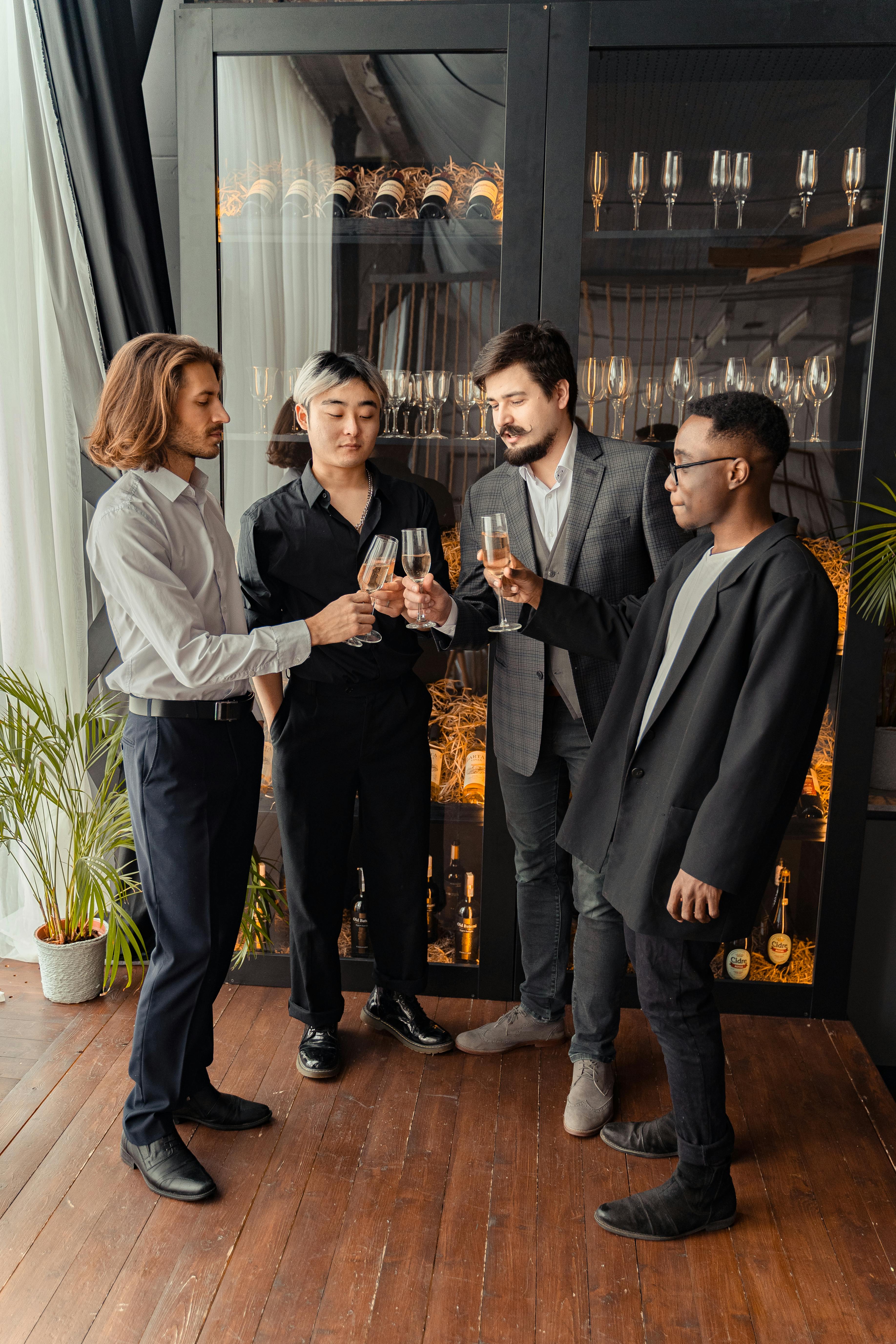 Multiracial Group of Men Holding Wine Glass · Free Stock Photo
