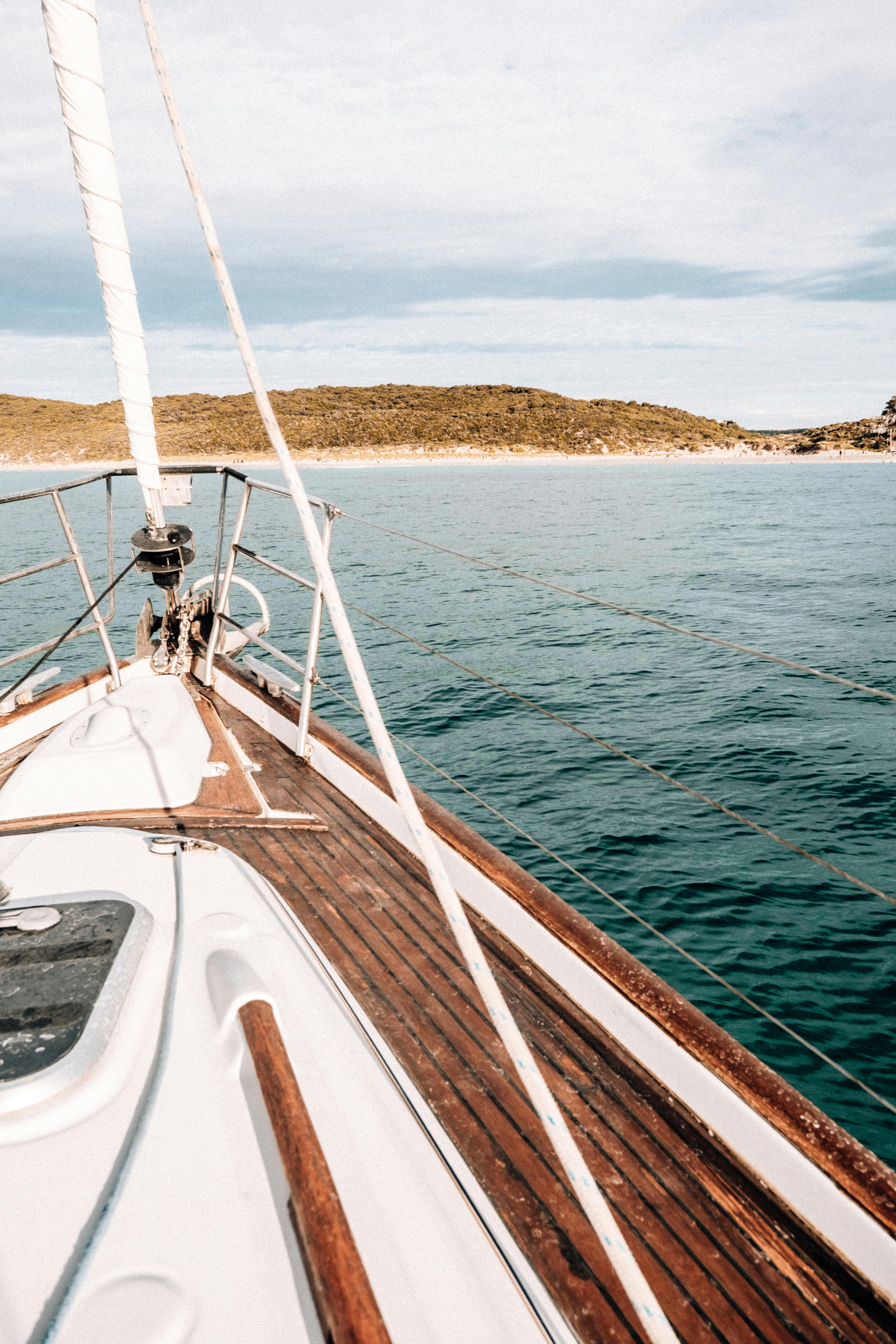 White and Brown Boat on Sea · Free Stock Photo