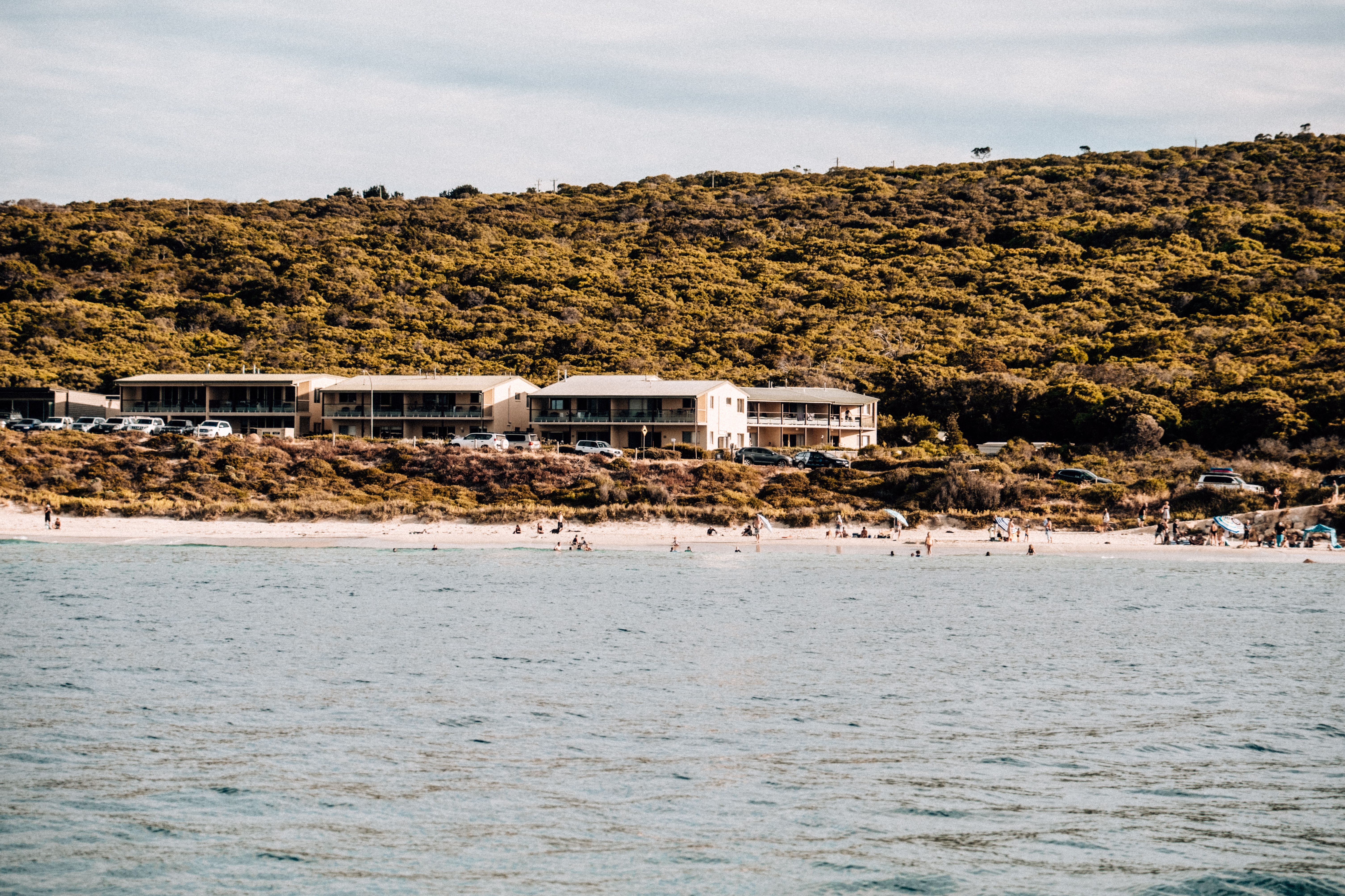 Distant View of a Beach across Water · Free Stock Photo