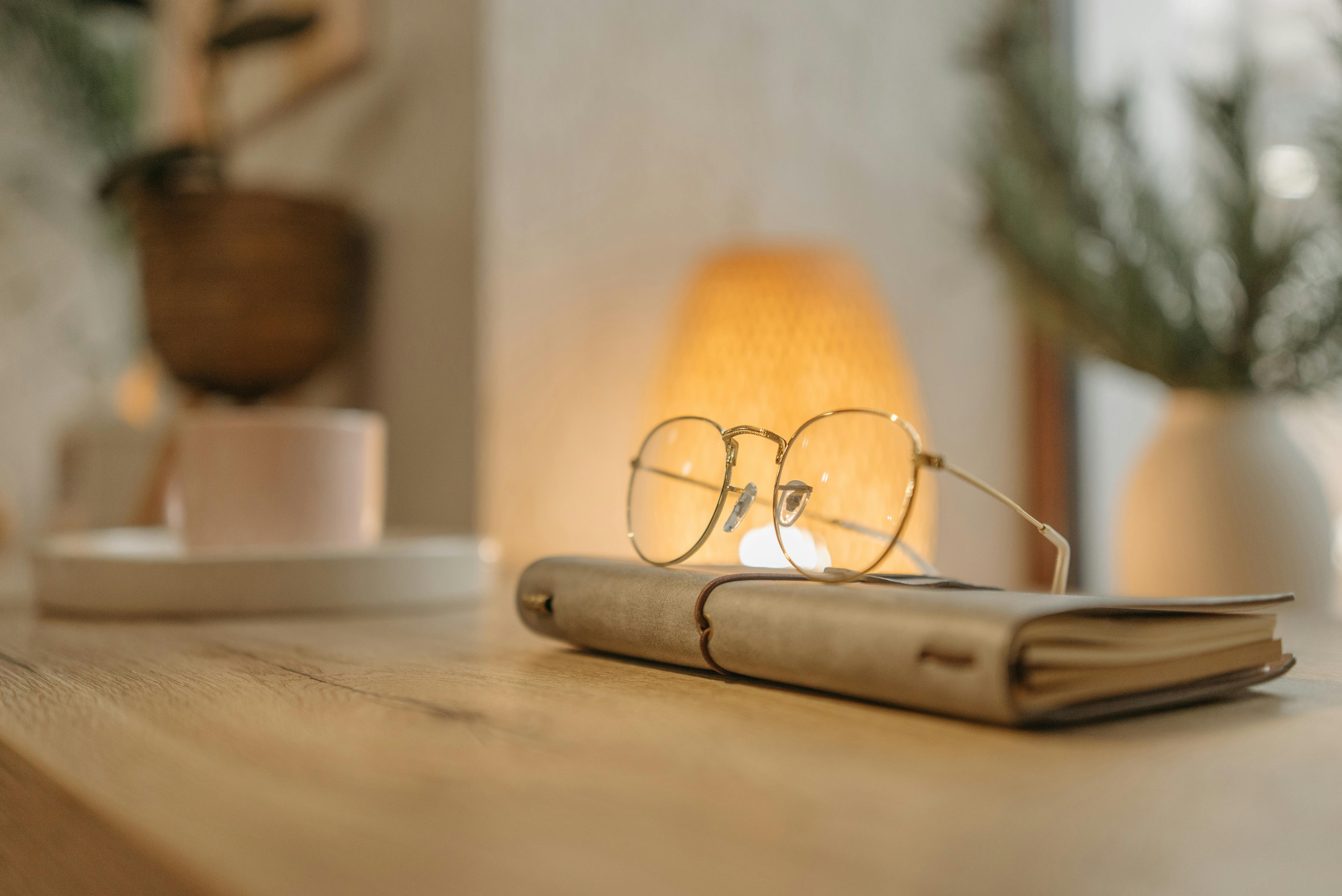 An Eyeglasses over a Book · Free Stock Photo