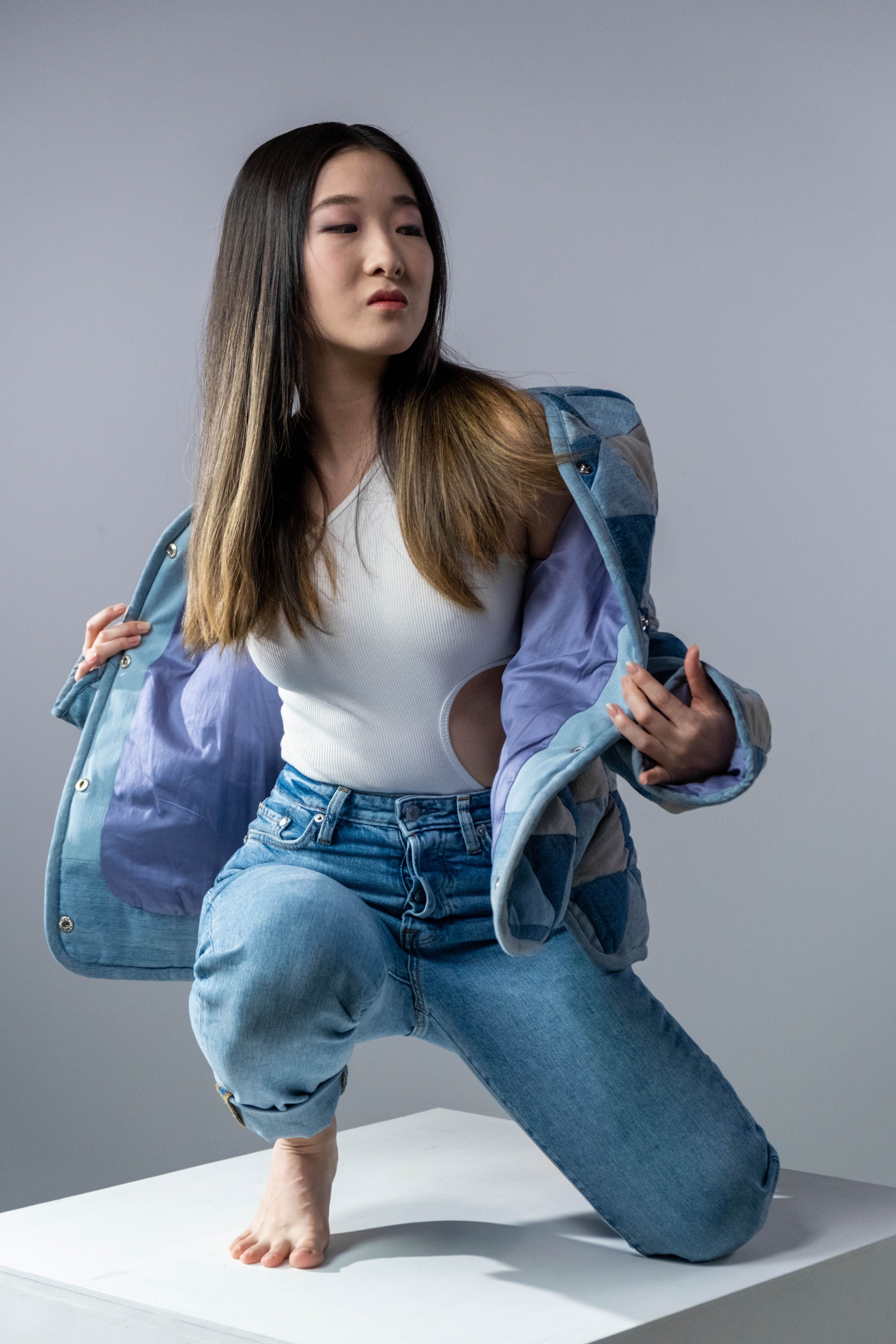 Man and Two Women in Denim Jackets Posing · Free Stock Photo