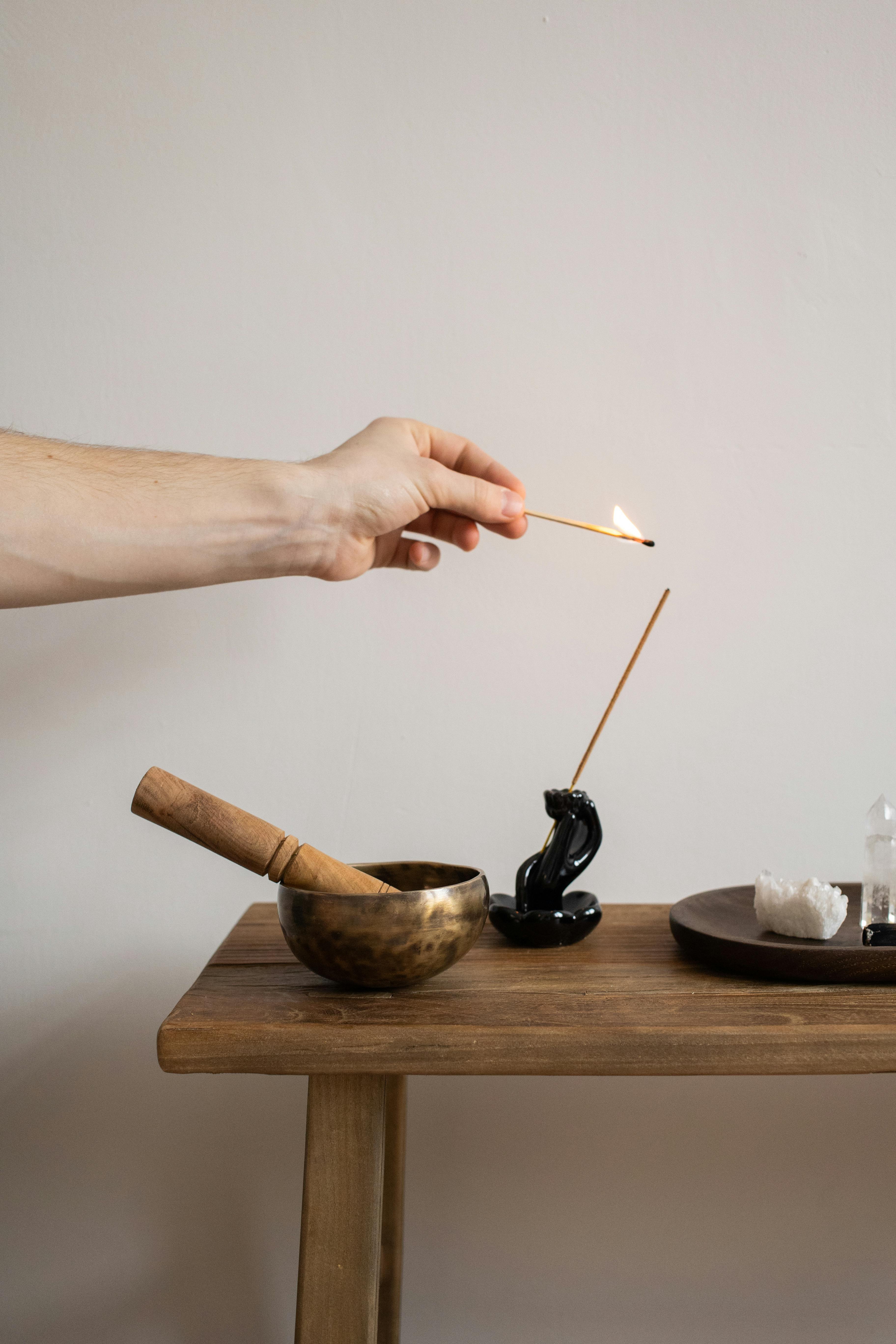 Hand Lighting Incense Stick · Free Stock Photo