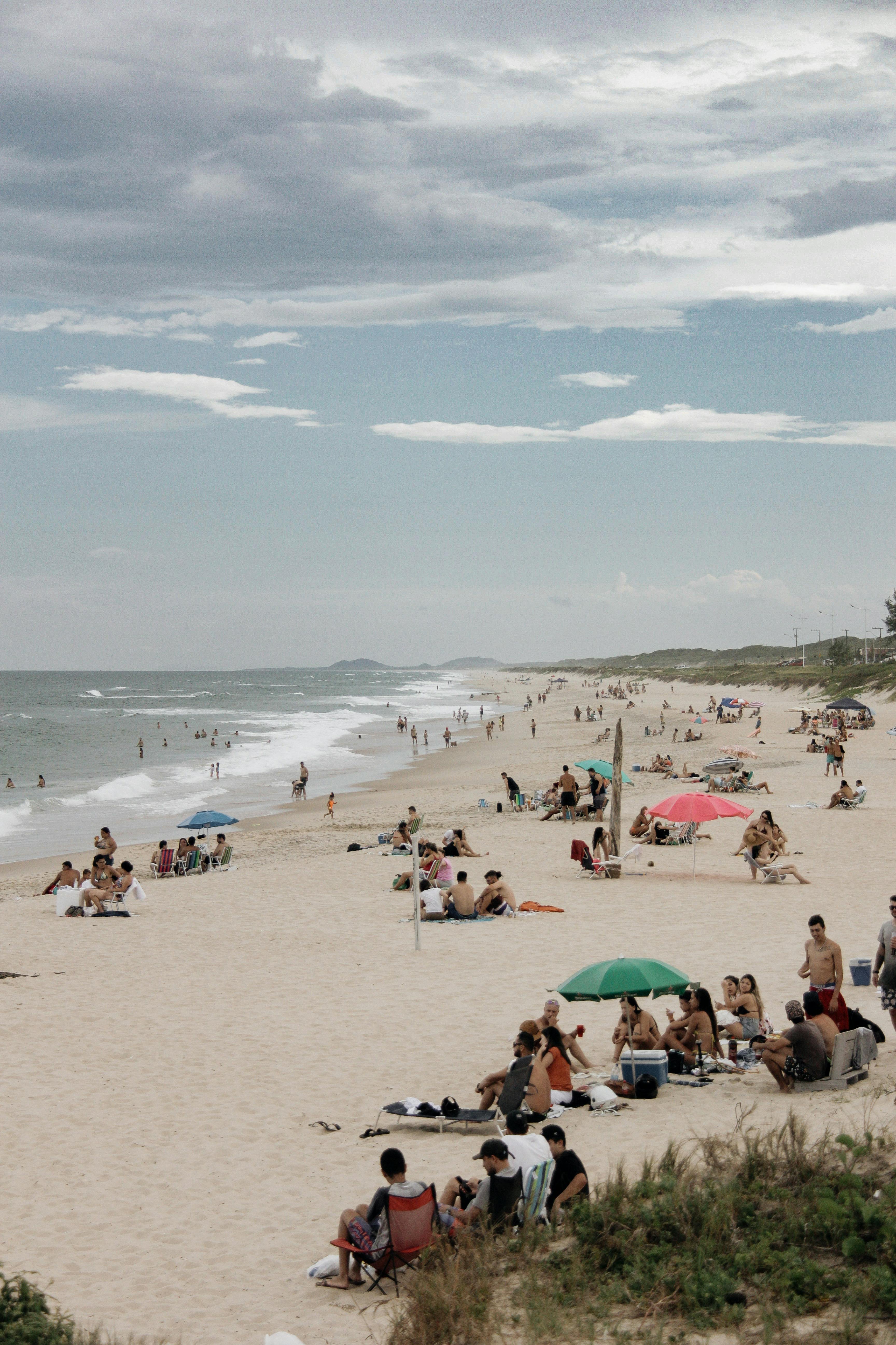 People Chilling on the Beach · Free Stock Photo