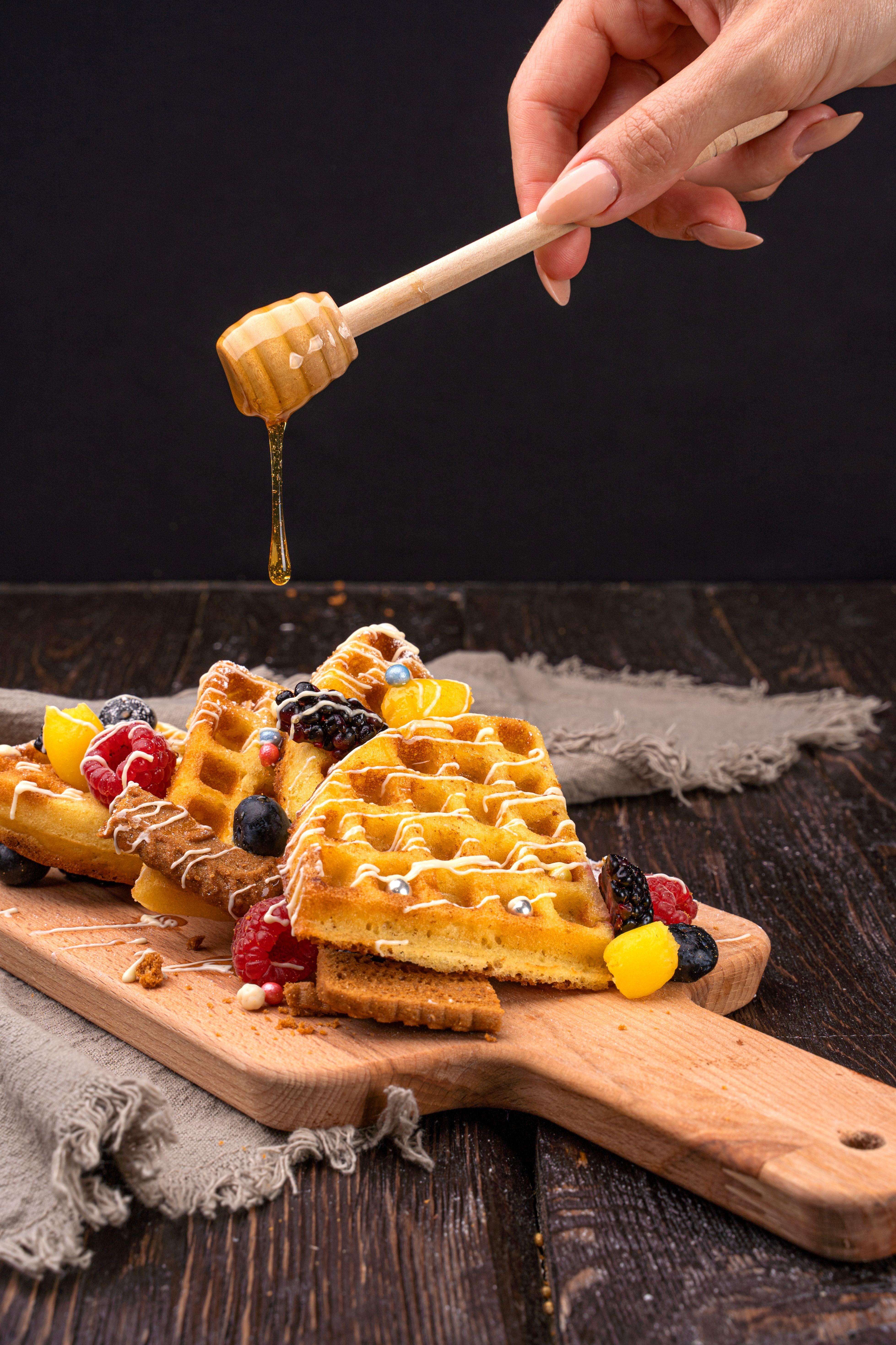 Waffles Coated With Syrup on a White Cloth · Free Stock Photo