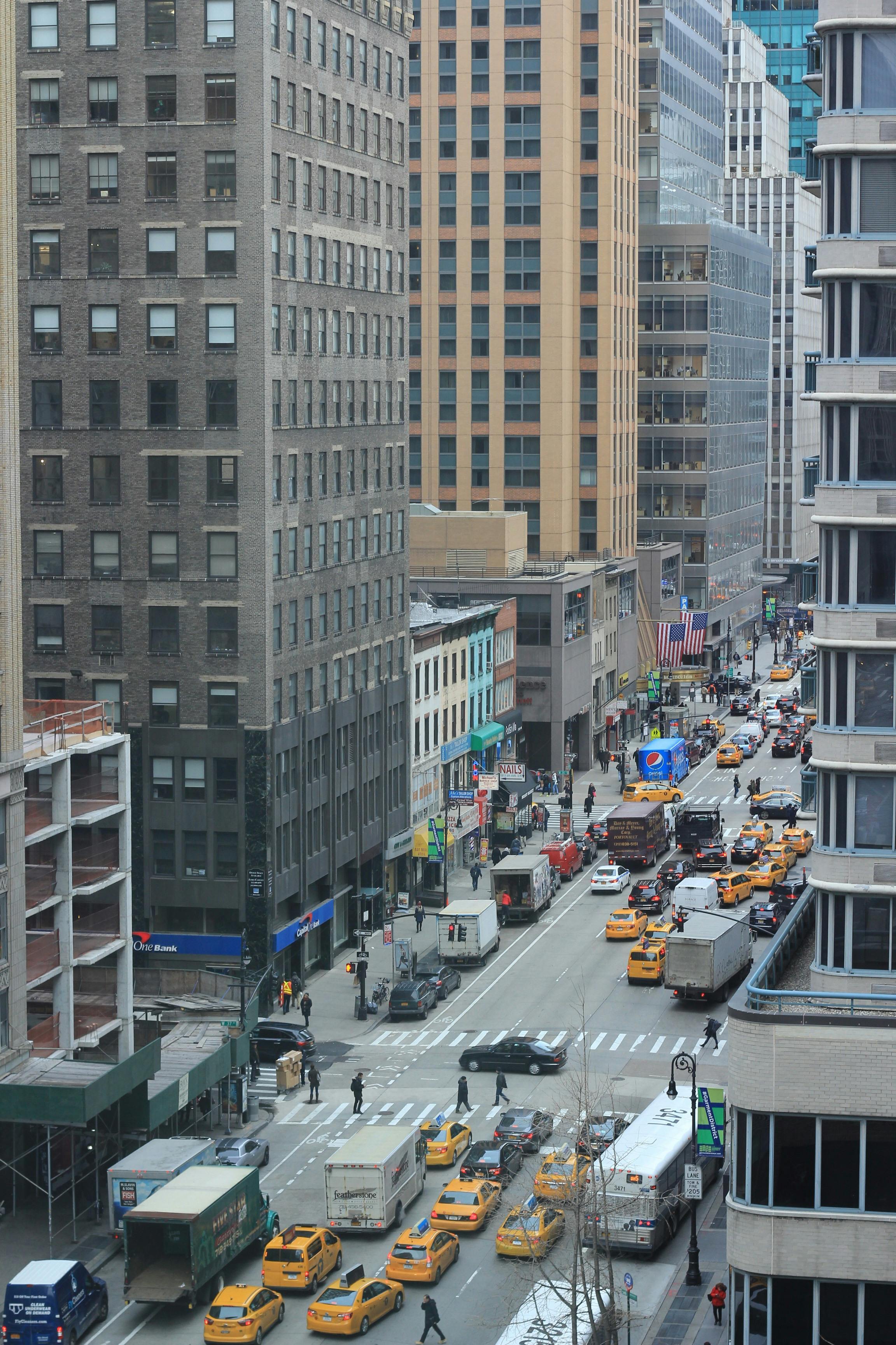 Empty Street Between High Rise Buildings during Nighttime · Free Stock ...