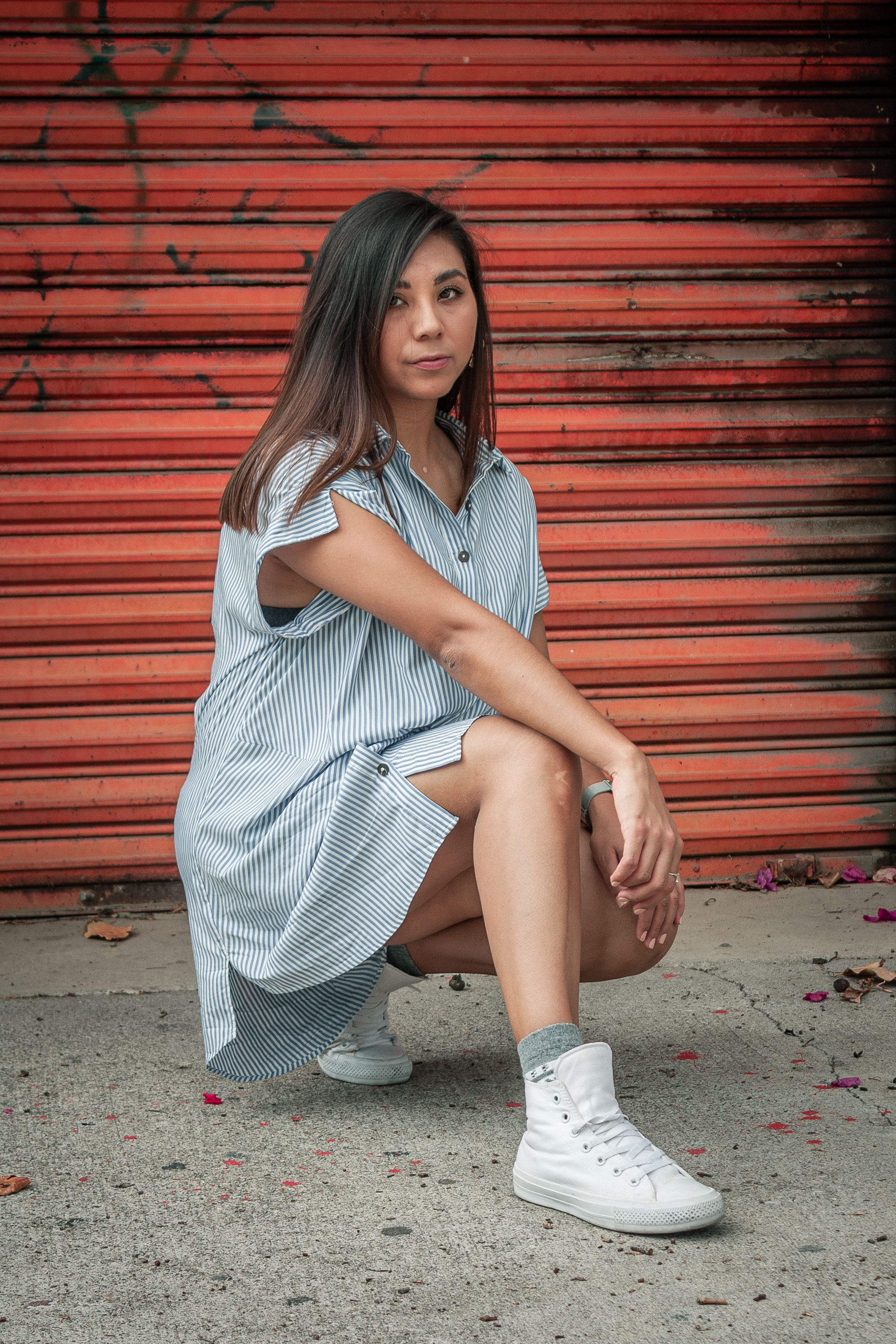 A Woman in White Dress Crouching · Free Stock Photo