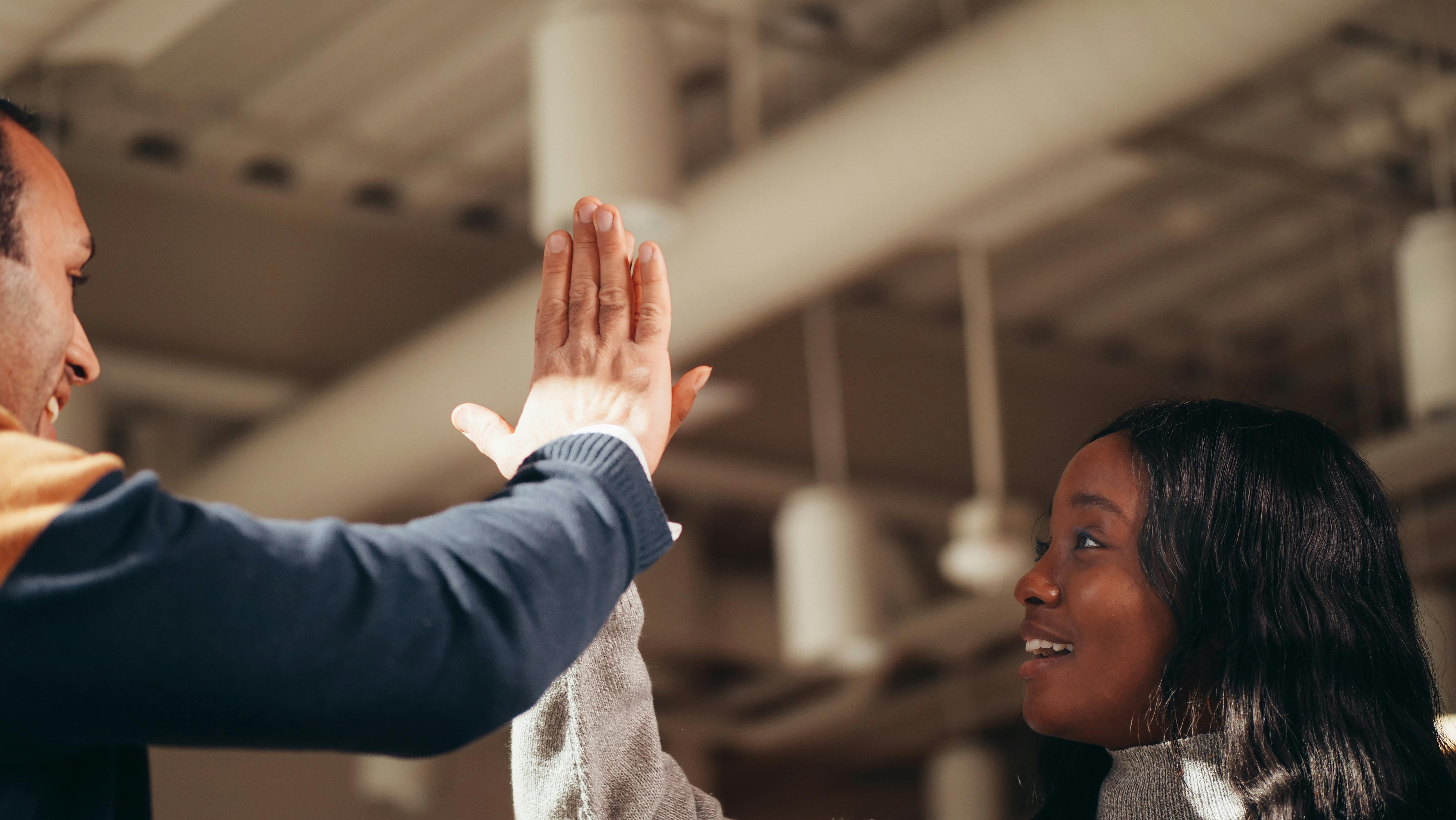 Close-up Photo of People doing High Five · Free Stock Photo