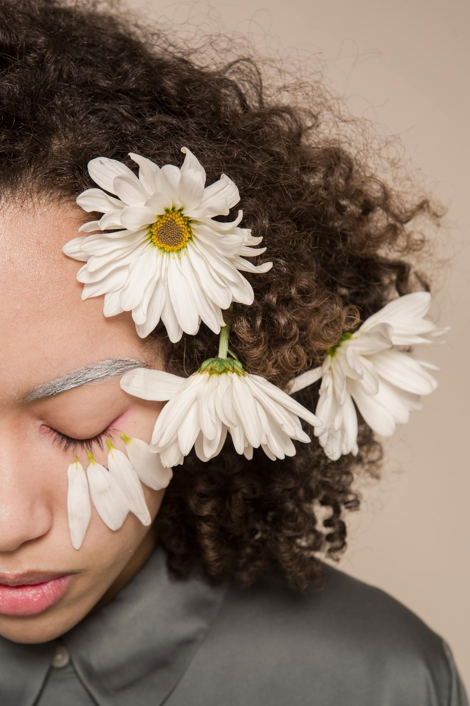 Depressed Ethnic Woman With Flowers In Hair Free Stock Photo depressed-ethnic-woman-with-flowers-in-hair-free-stock-photo