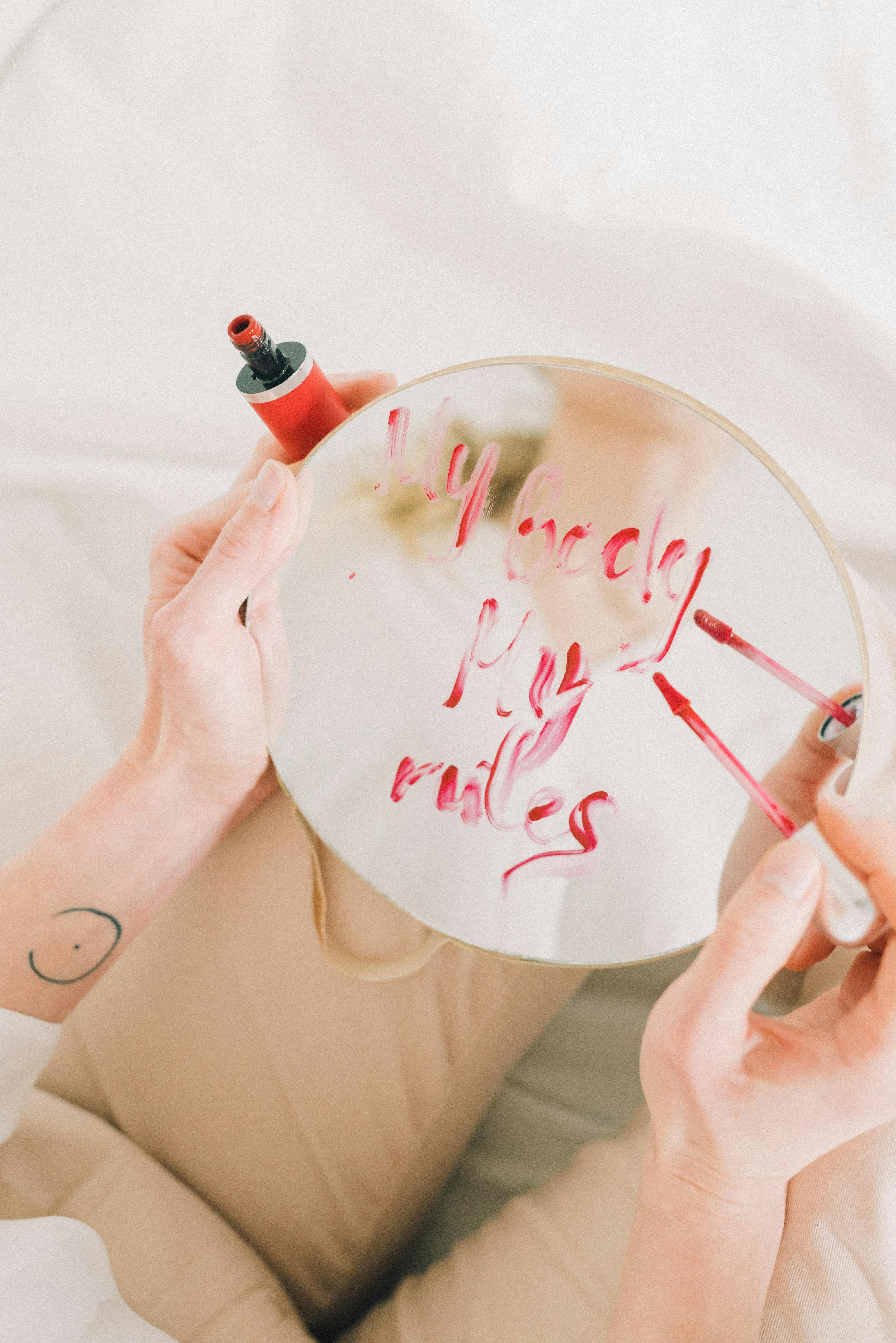 A Red Lipstick on a Mirror · Free Stock Photo