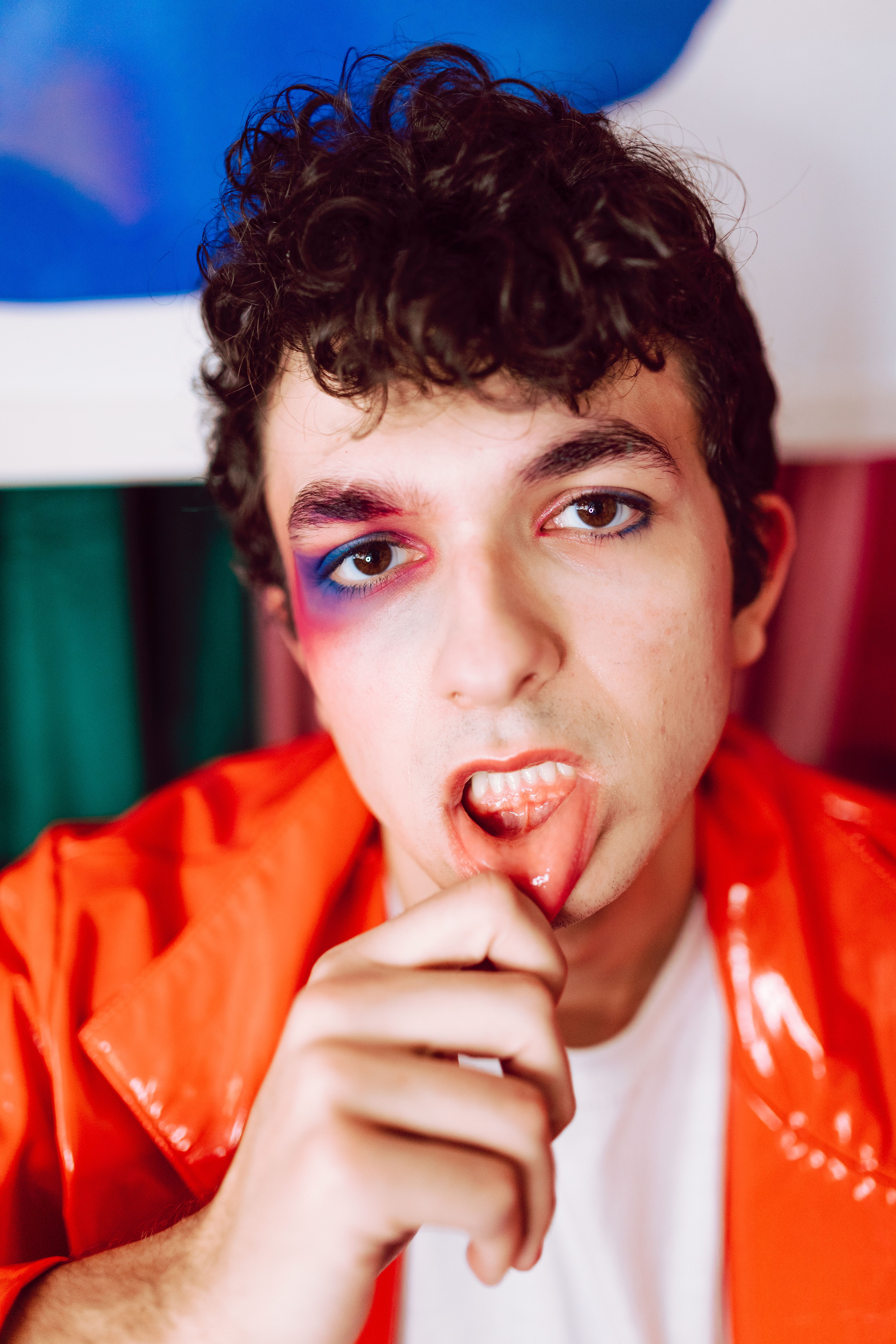 Portrait of a Man Holding His Lip · Free Stock Photo