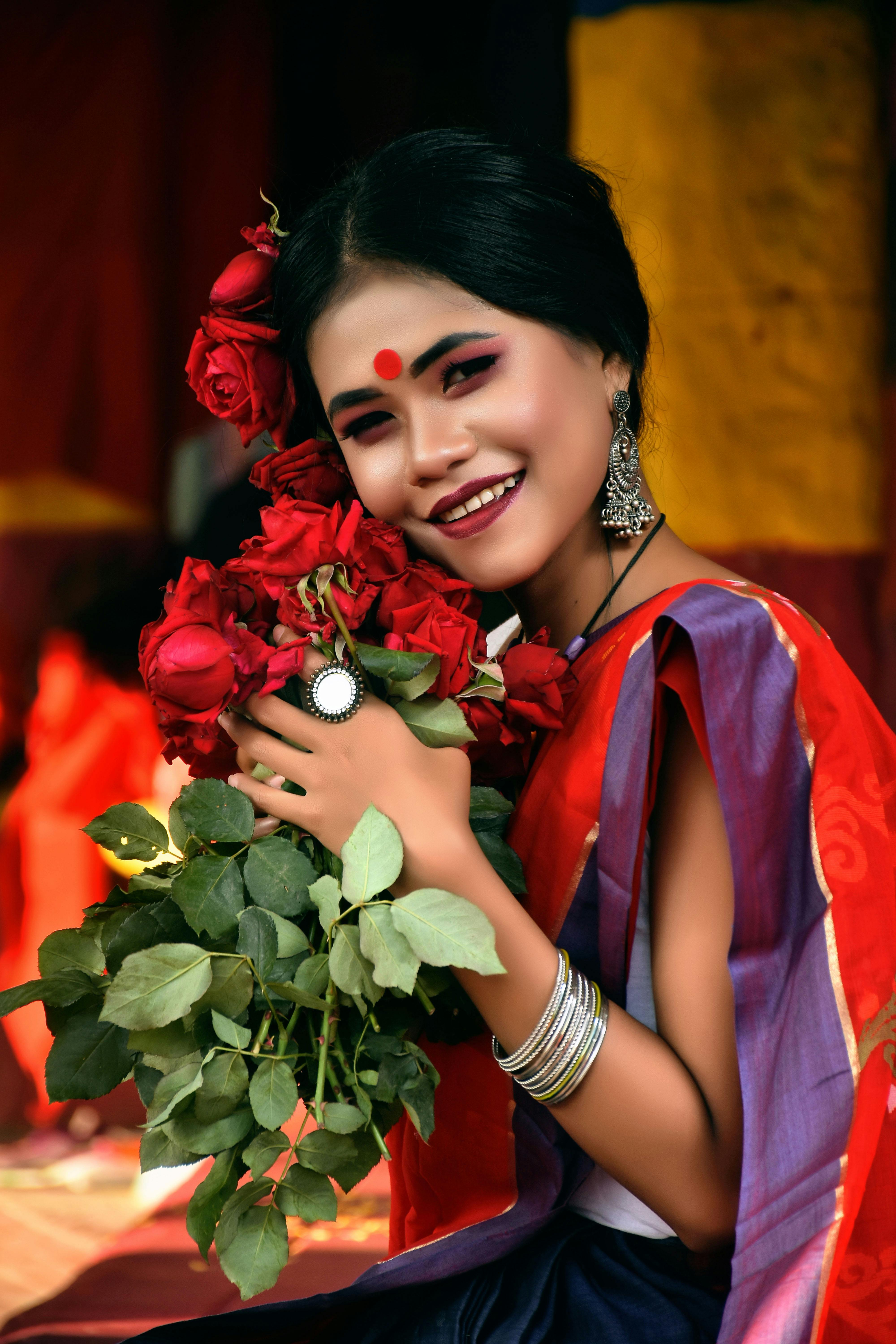 Woman Posing in Traditional Clothing · Free Stock Photo