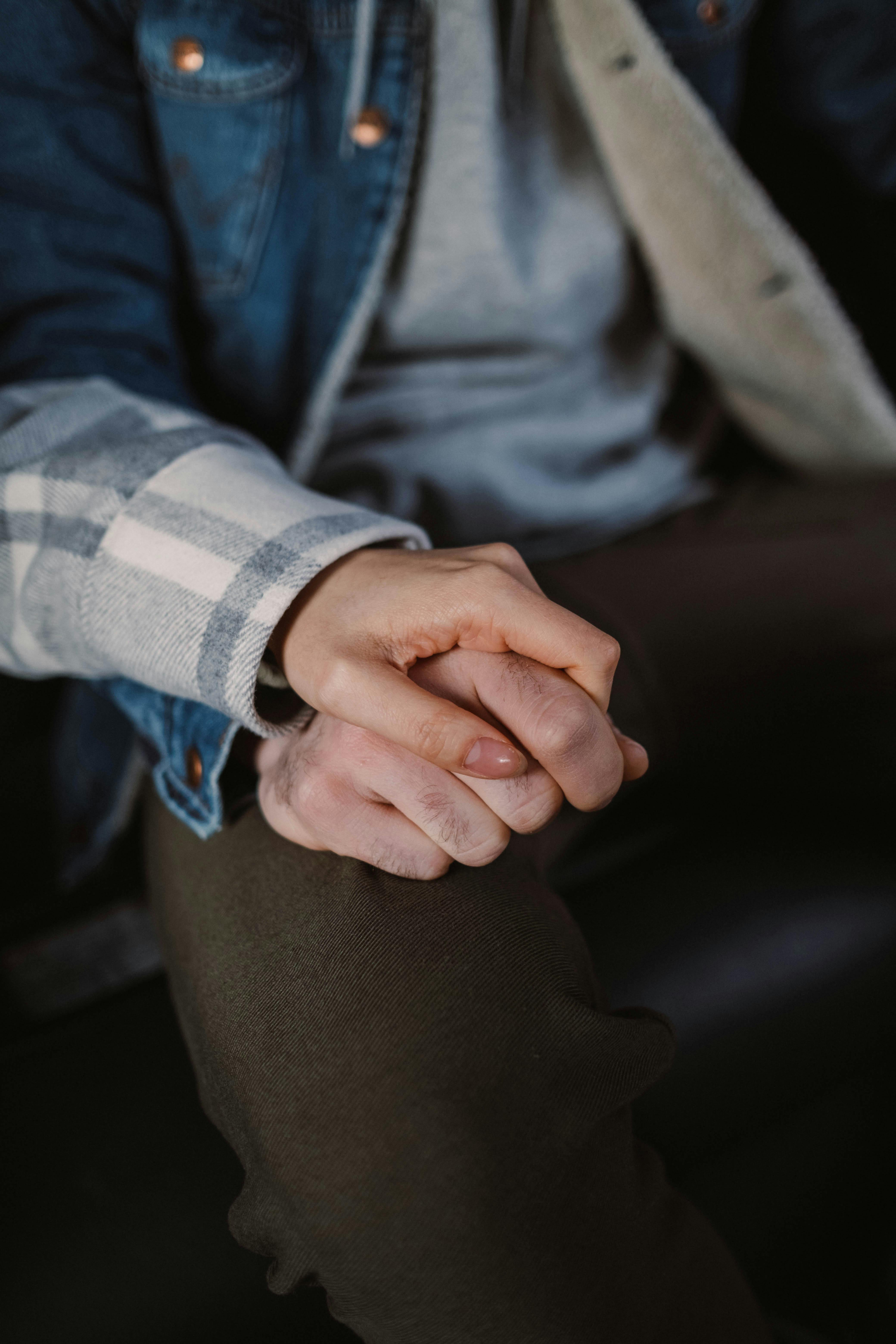 Two People Holding Hands · Free Stock Photo