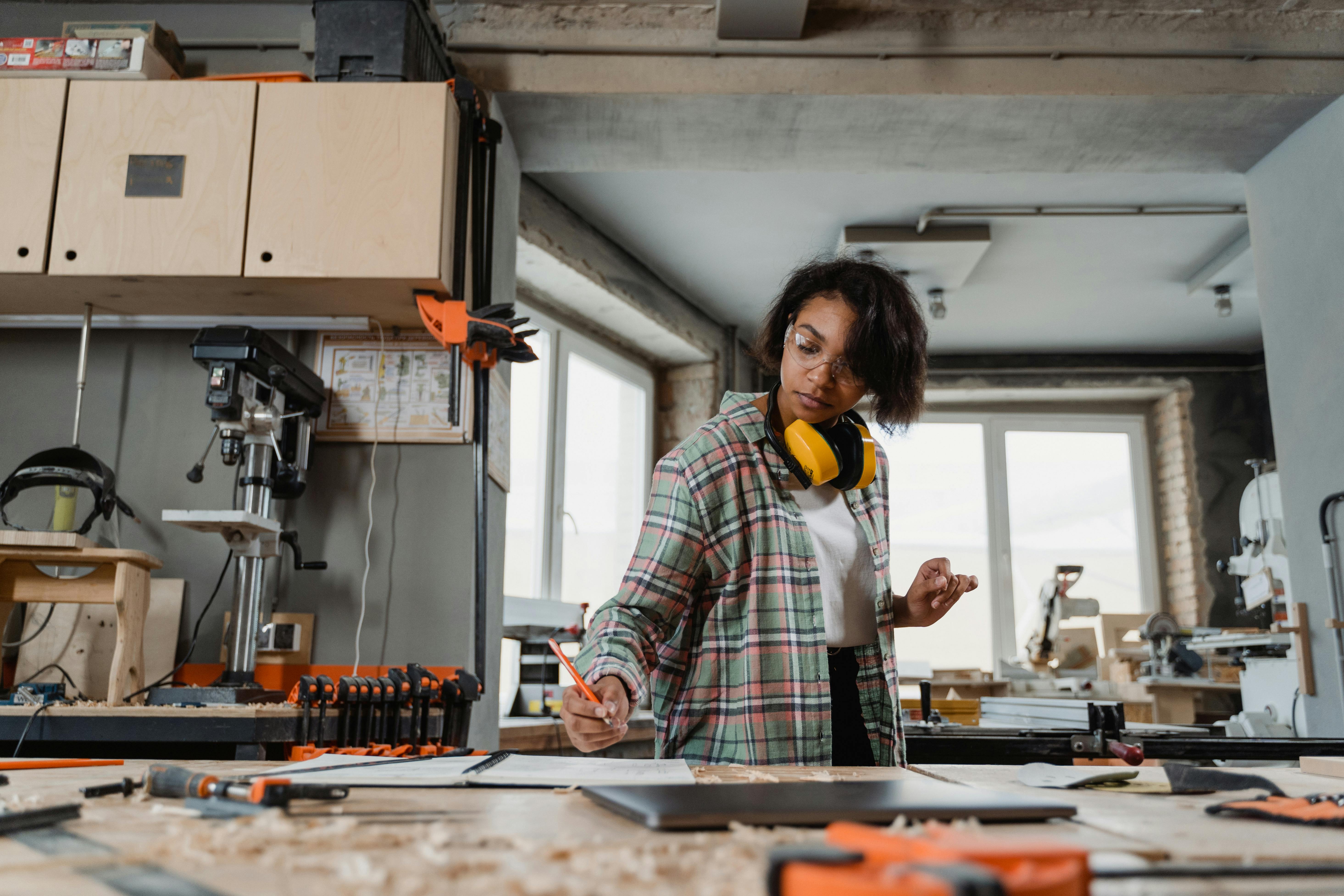 A Woman Doing Carpentry · Free Stock Photo