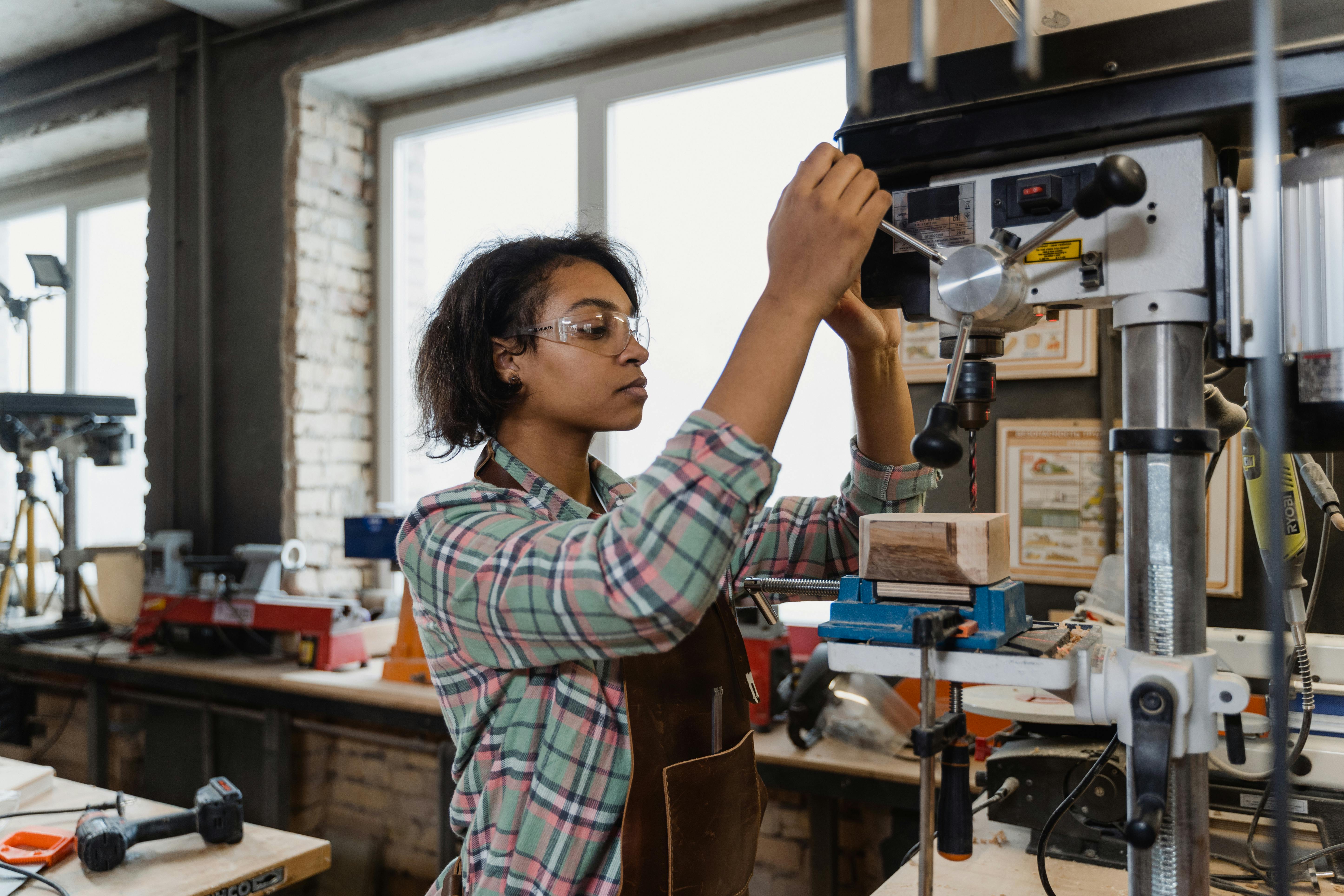 A Woman Doing Carpentry · Free Stock Photo