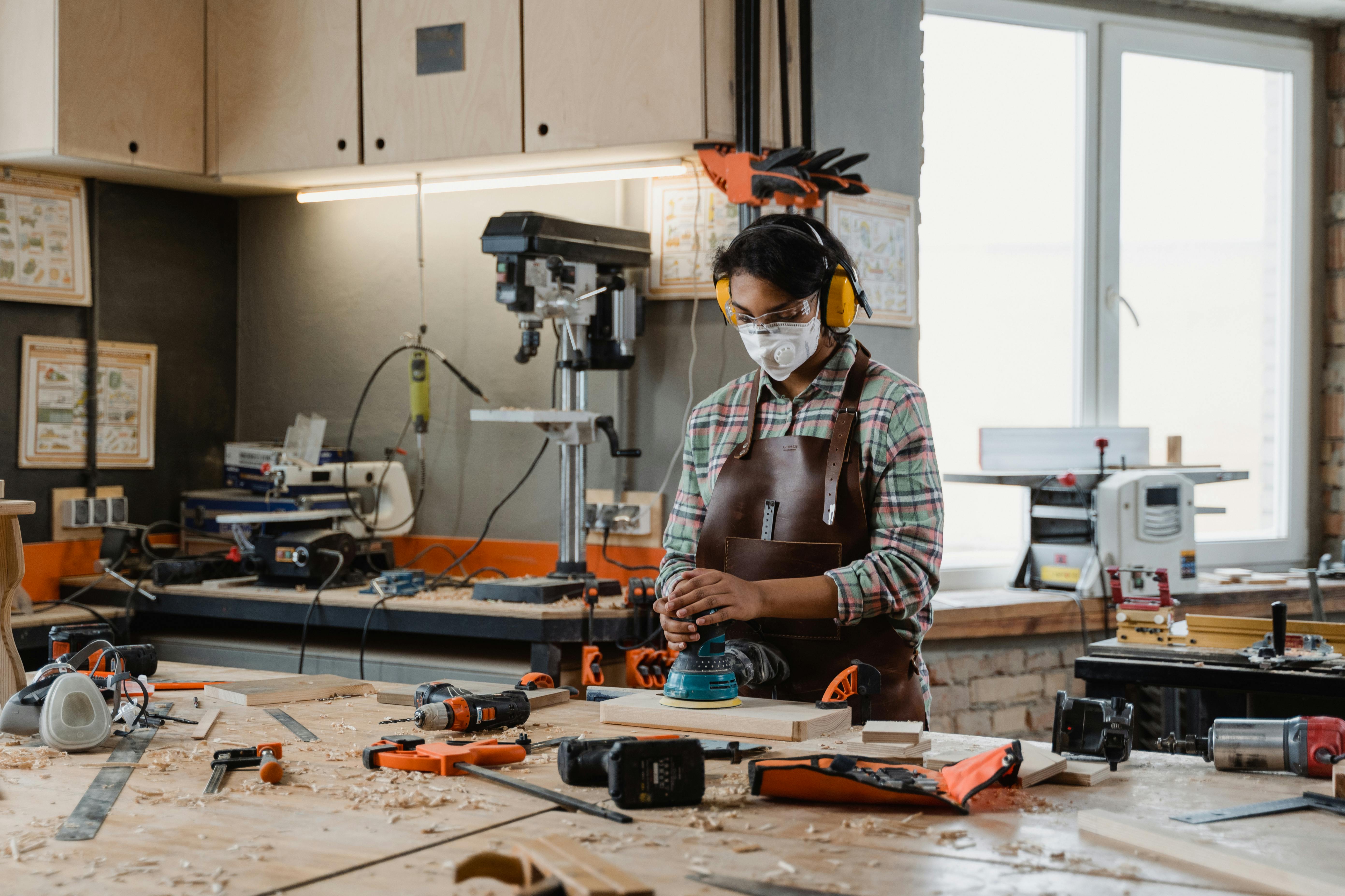 A Woman Doing Carpentry · Free Stock Photo