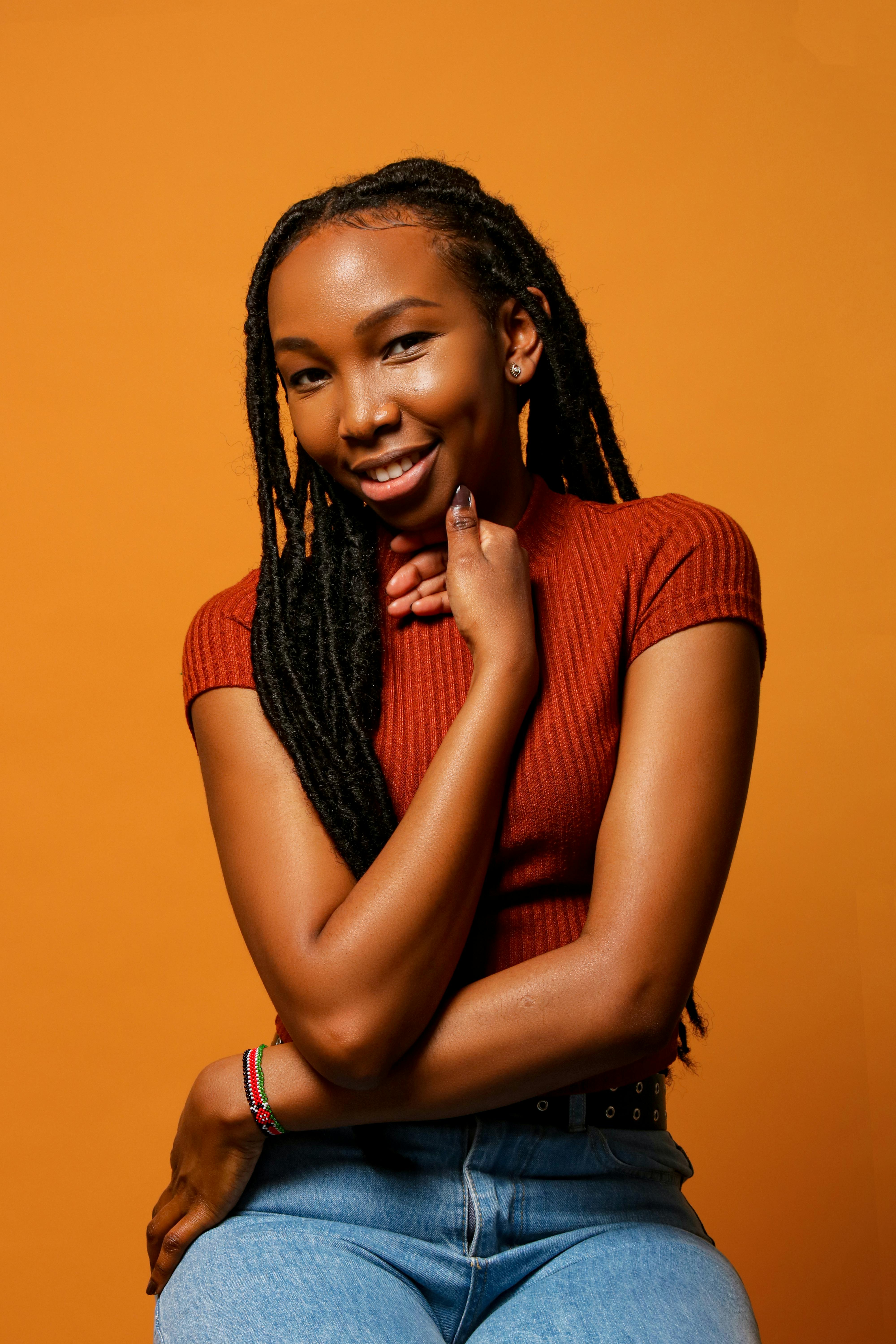 Woman in Red Shirt Smiling · Free Stock Photo