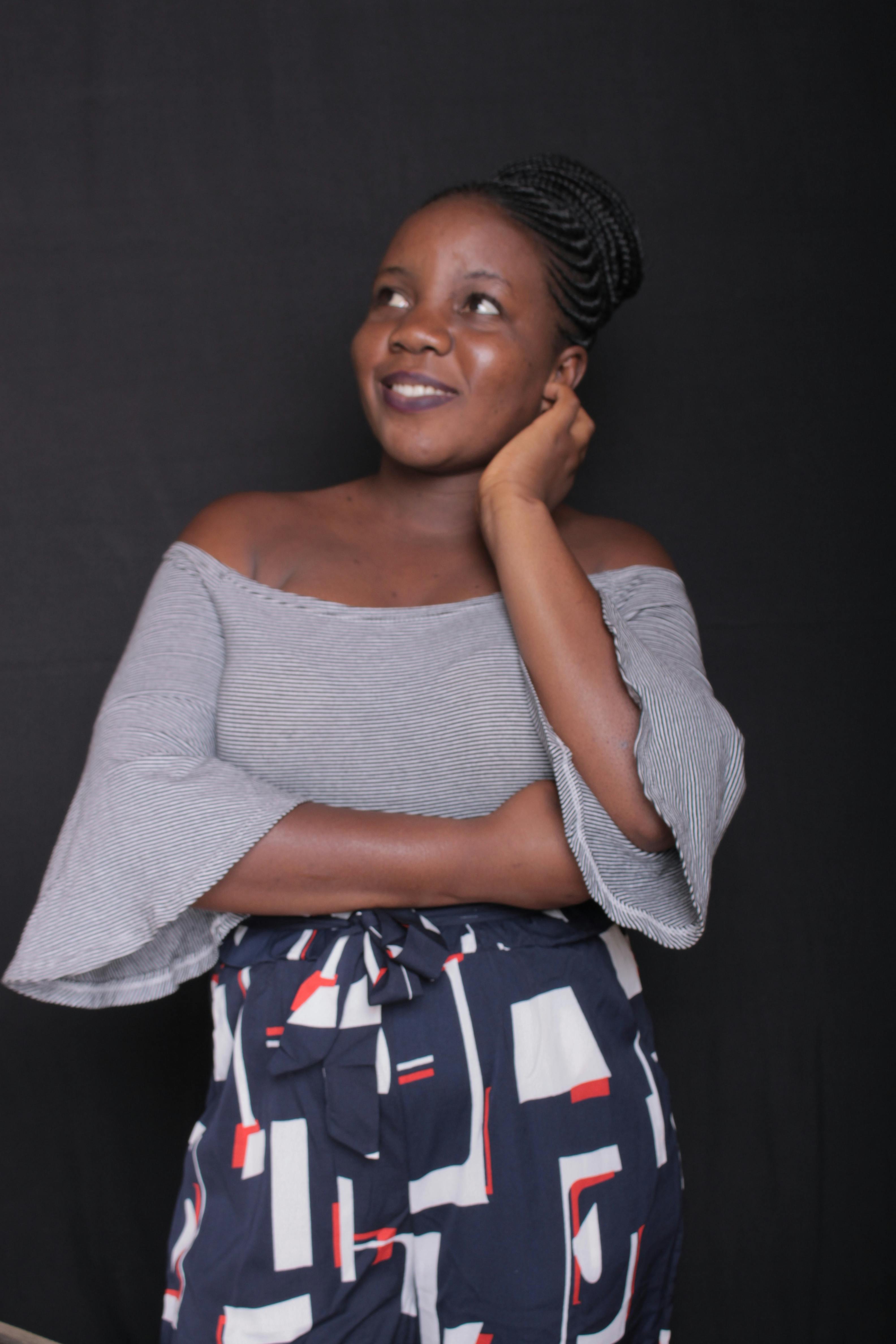 Side View of a Woman Smiling · Free Stock Photo