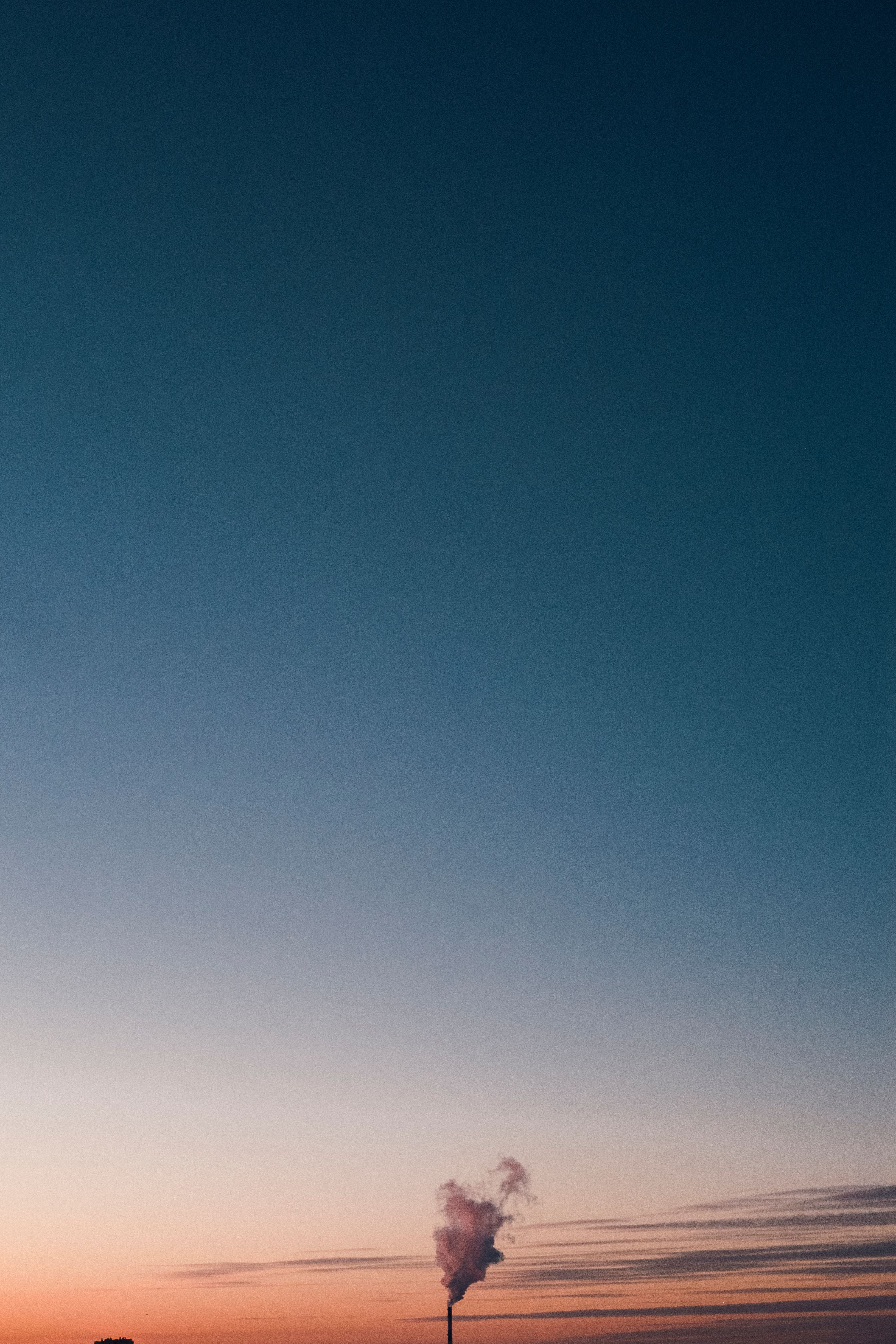 Clear sunset sky with smoke · Free Stock Photo