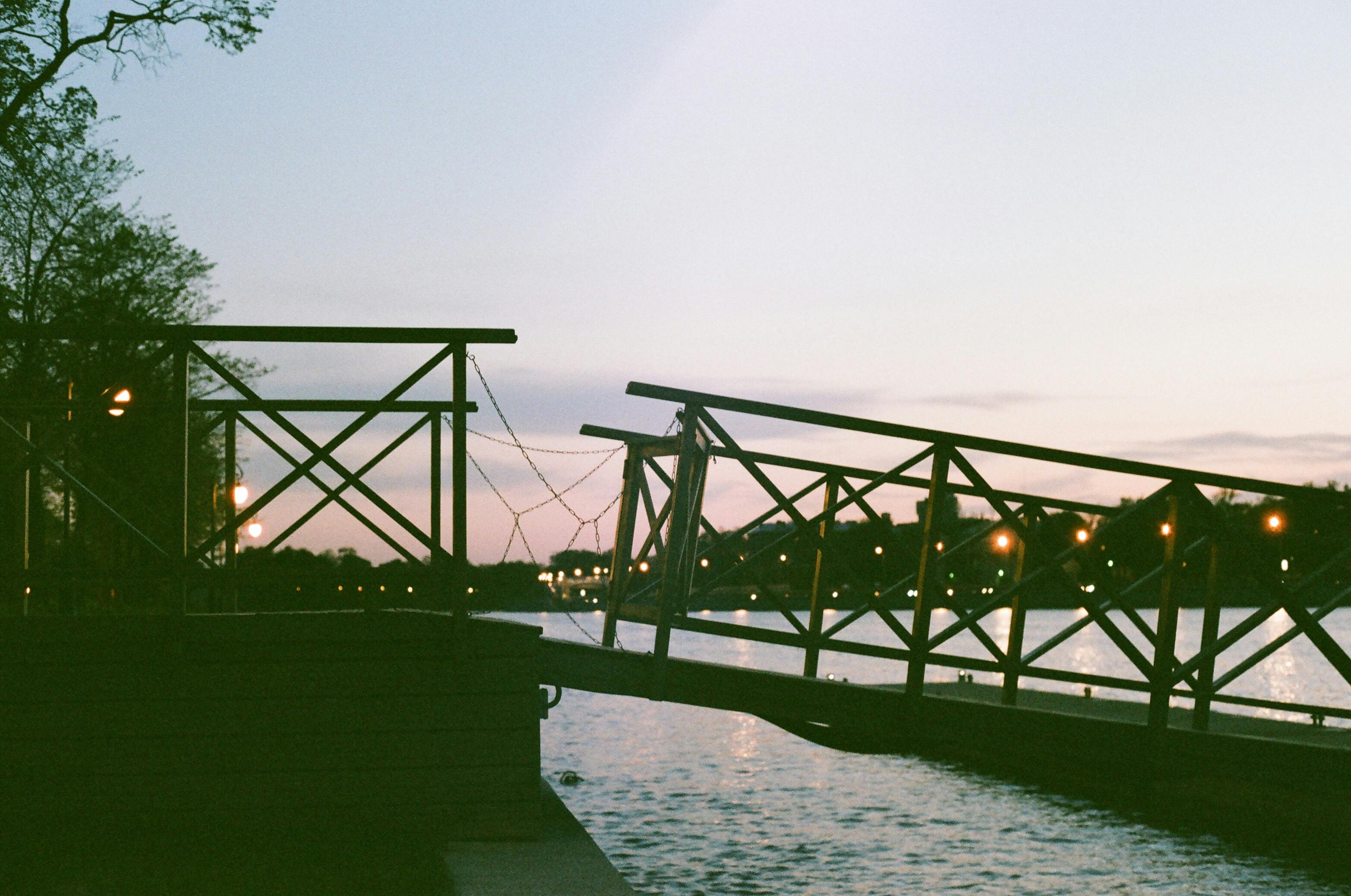 A Wooden Footbridge over Body of Water · Free Stock Photo