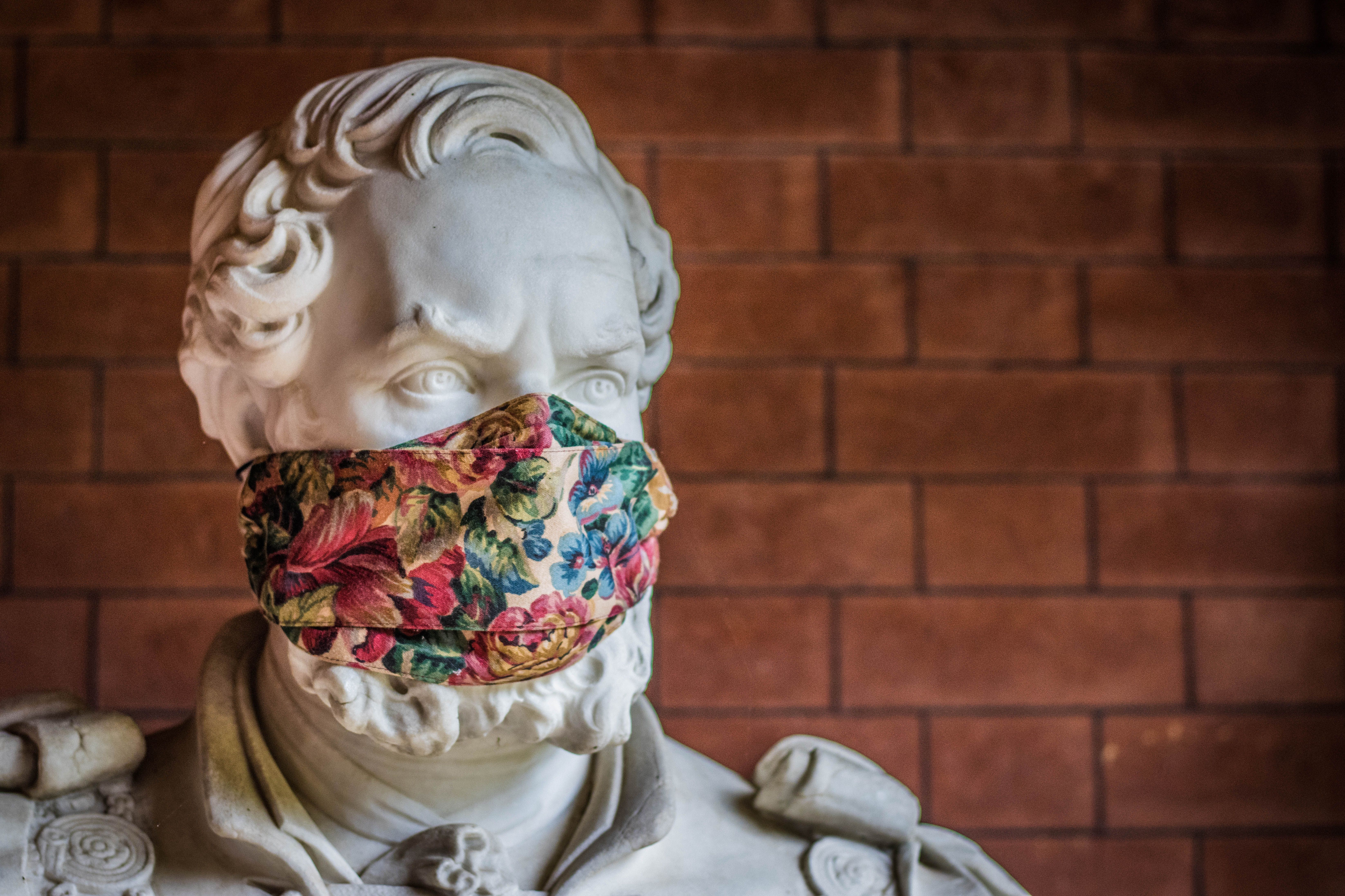 A Statue With Face Mask · Free Stock Photo