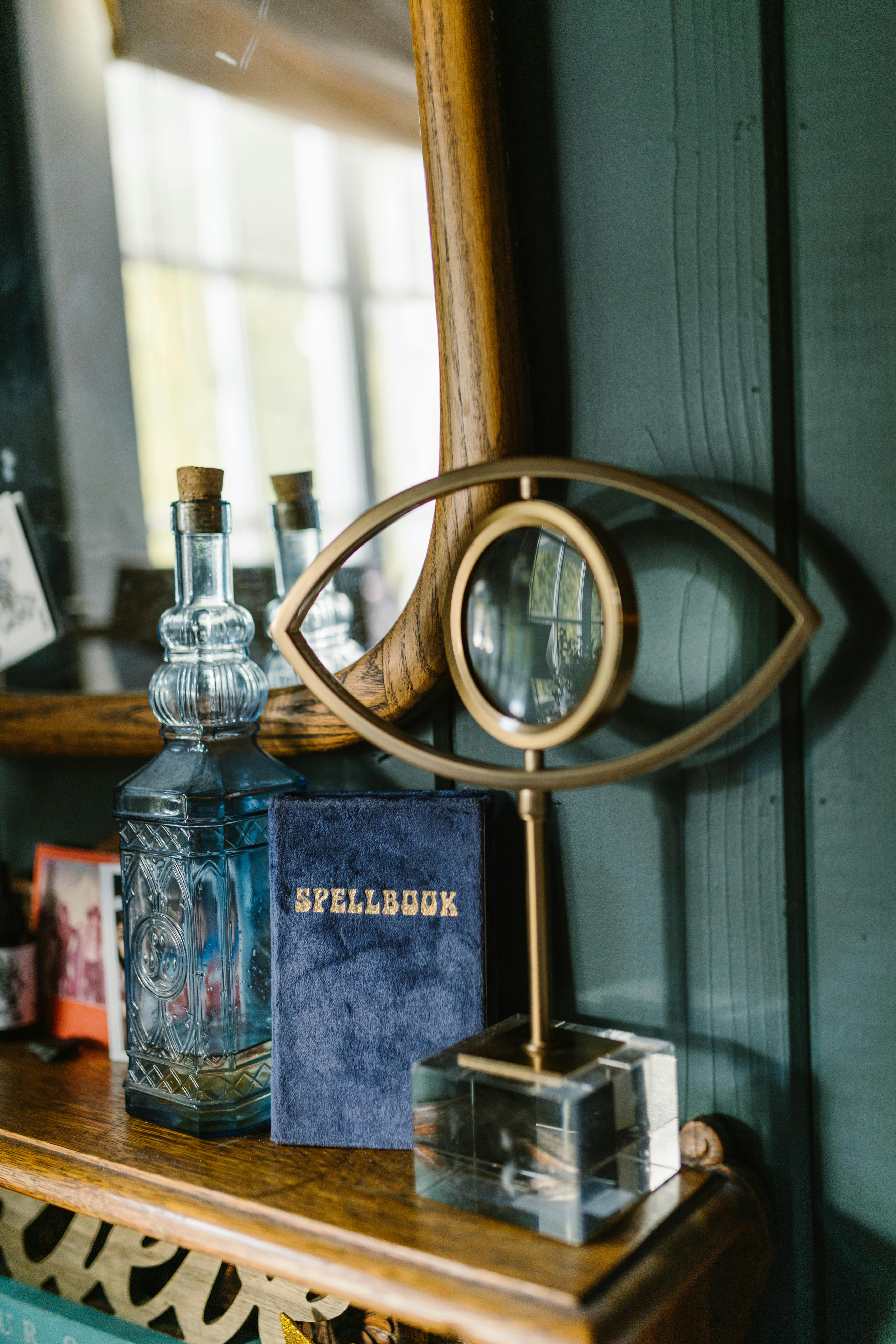 A Spell Book on the Wooden Table · Free Stock Photo