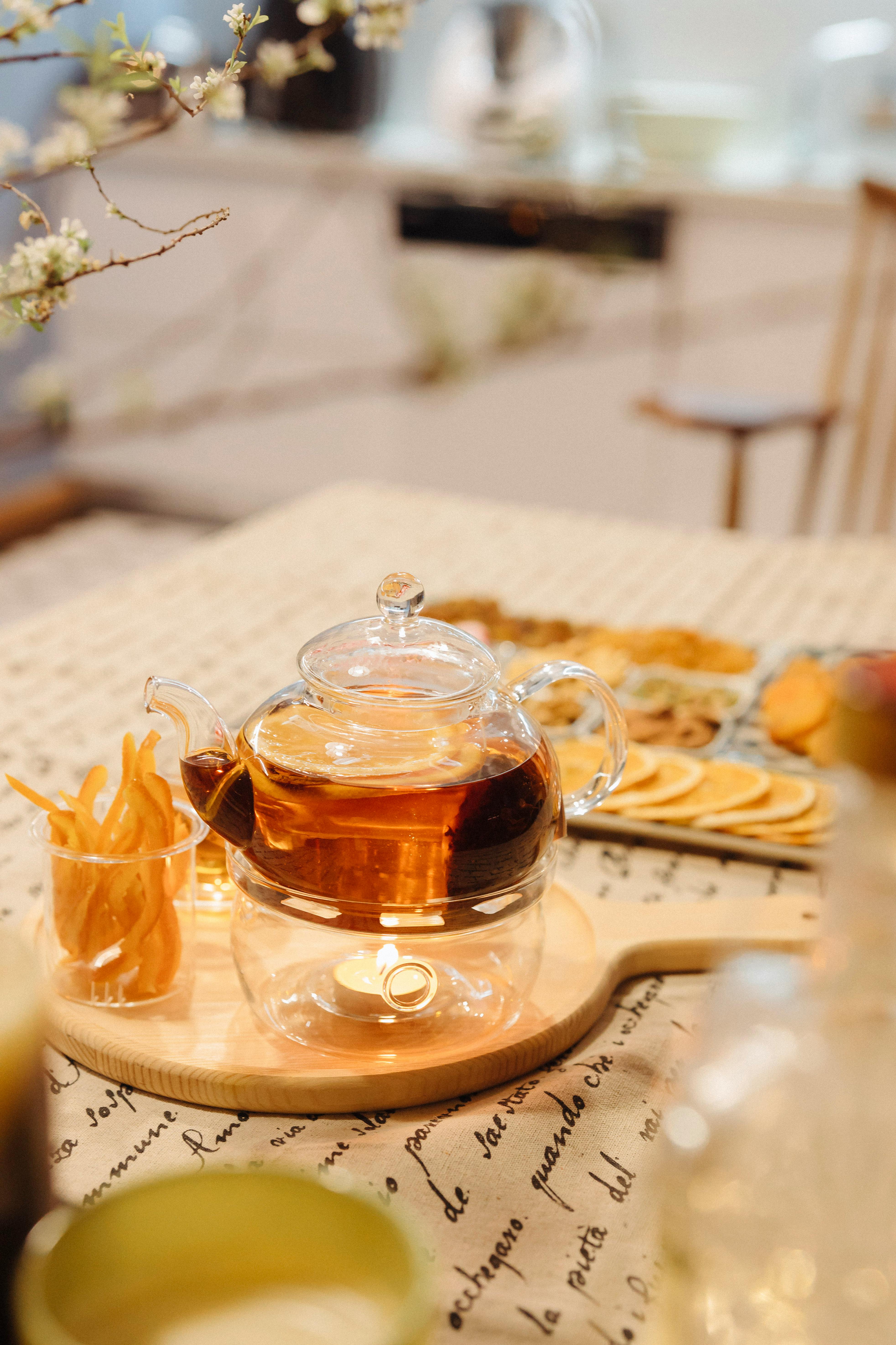 A Man Holding a Teapot · Free Stock Photo